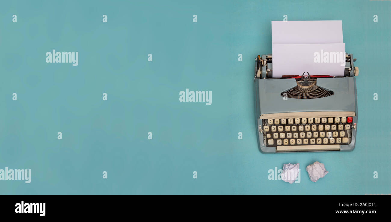 Vintage typewriter and crumpled papers with copy space banner Stock ...
