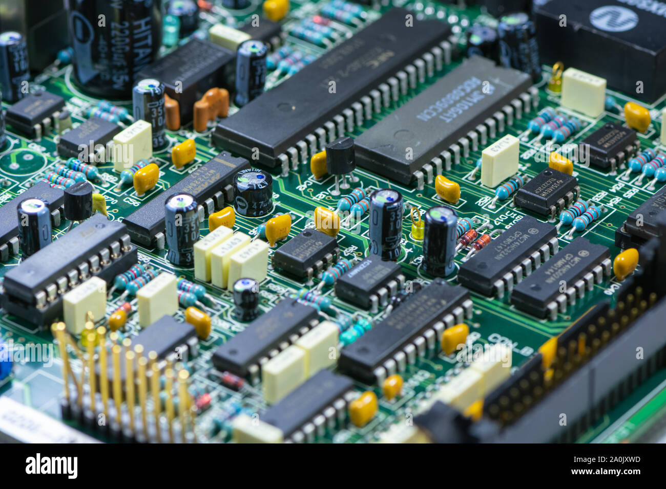 Close up shot of PCB unit with visible resistors, capacitors and micro ...