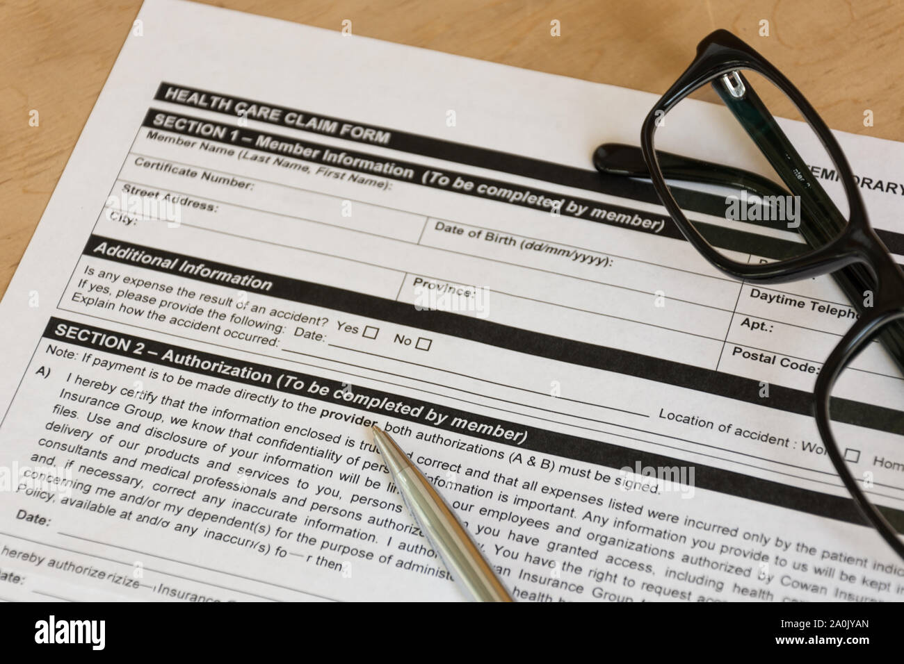 Medical insurance paper on wooden background. Health care claim form ...