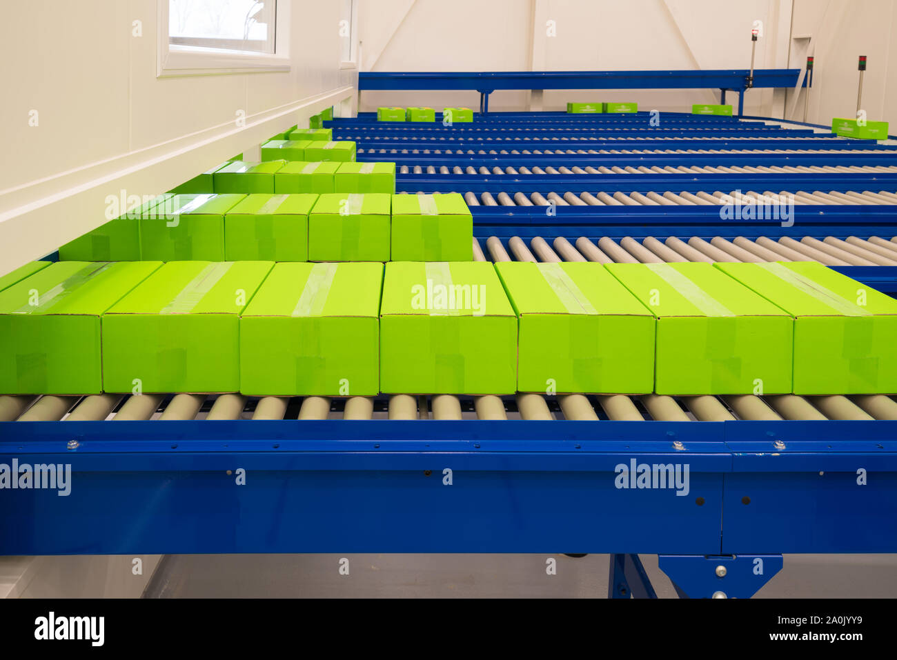 Conveyor belt boxes hi-res stock photography and images - Alamy