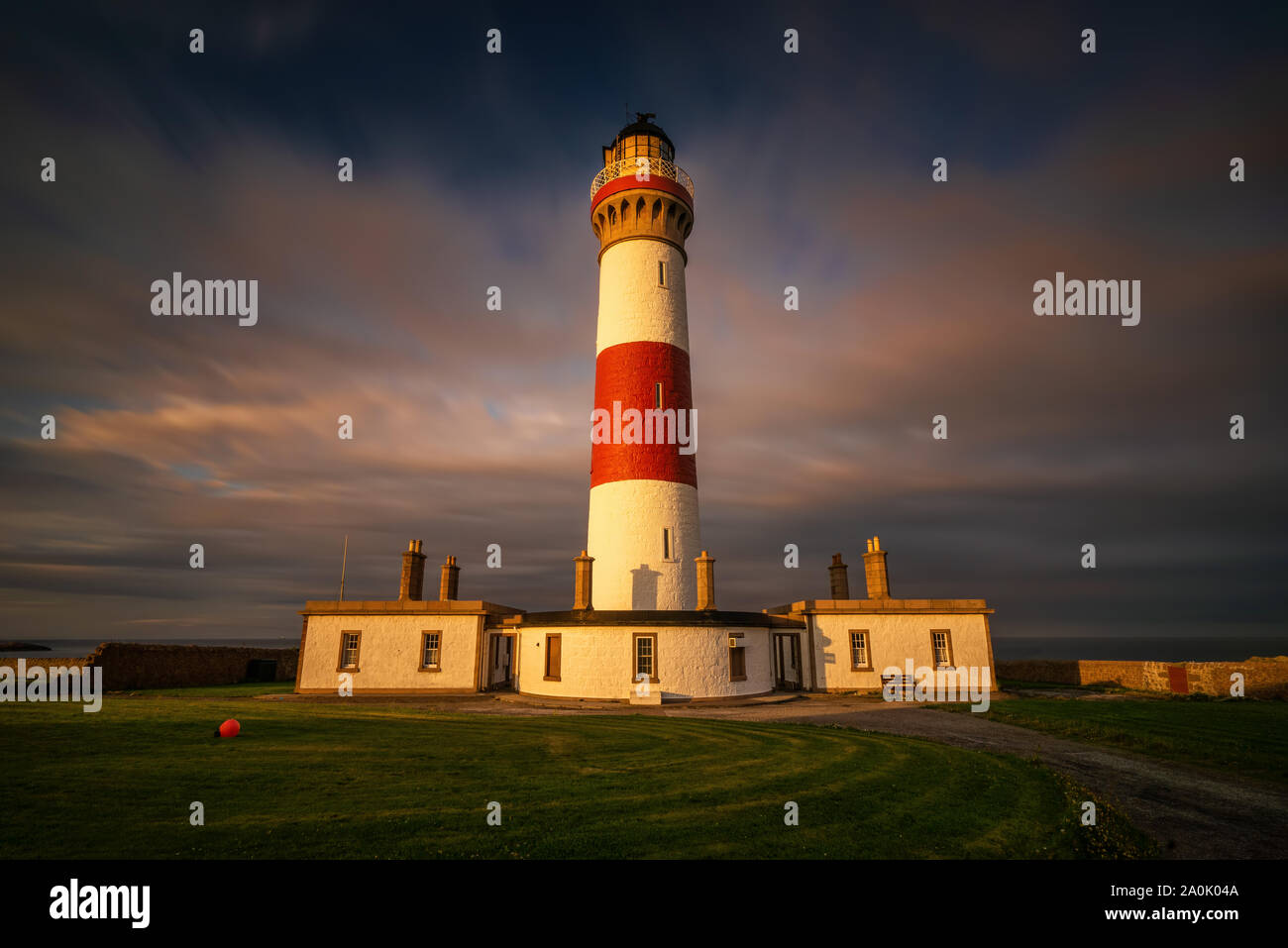 Buchanness Lighthouse in sunset light, Scotland Stock Photo - Alamy