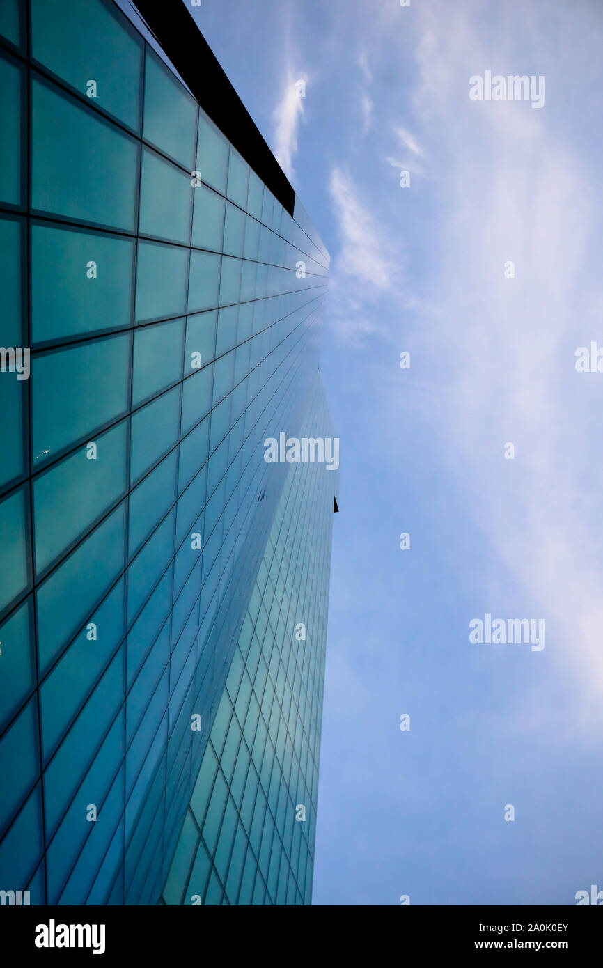 up view of high rise green glass building, low angle view of business ...