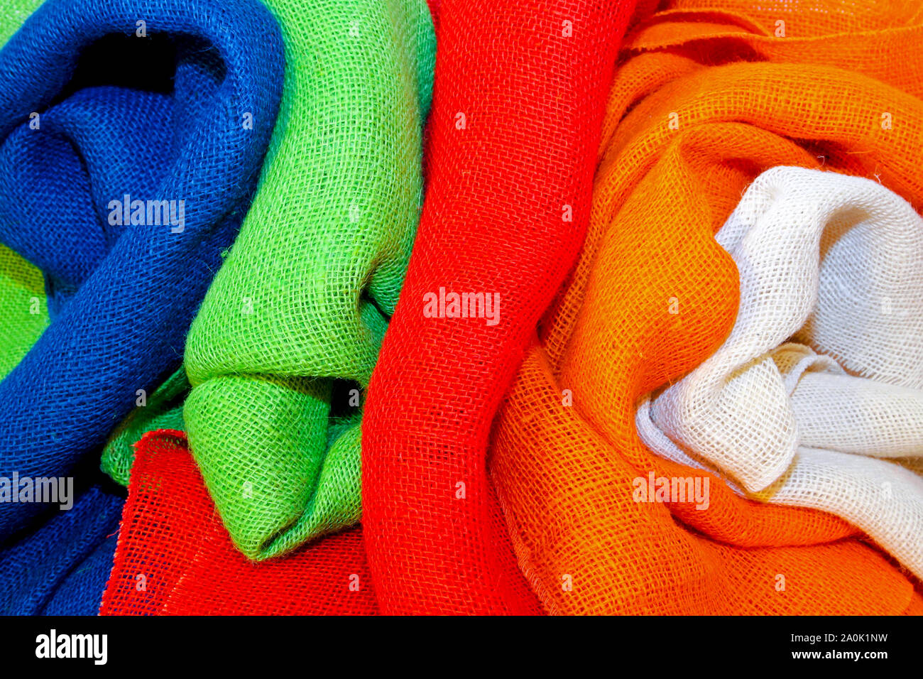 Wrinkled sack cloth in vivid colors assortment Stock Photo - Alamy
