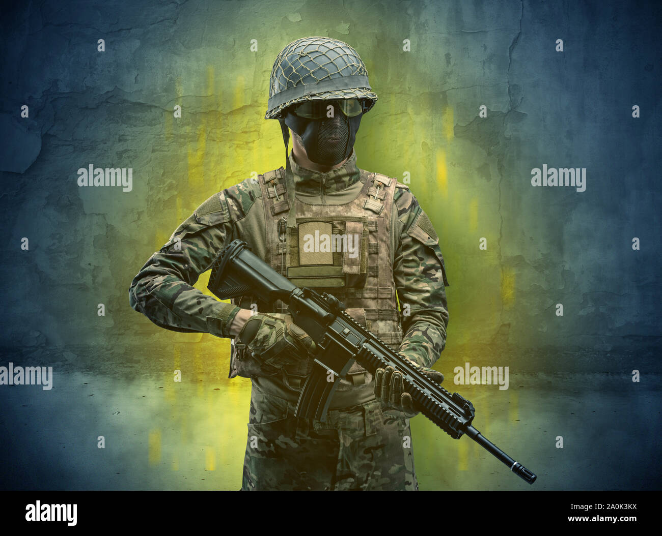 Hazard, menace soldier in a ruined crumbly building with arms on his ...