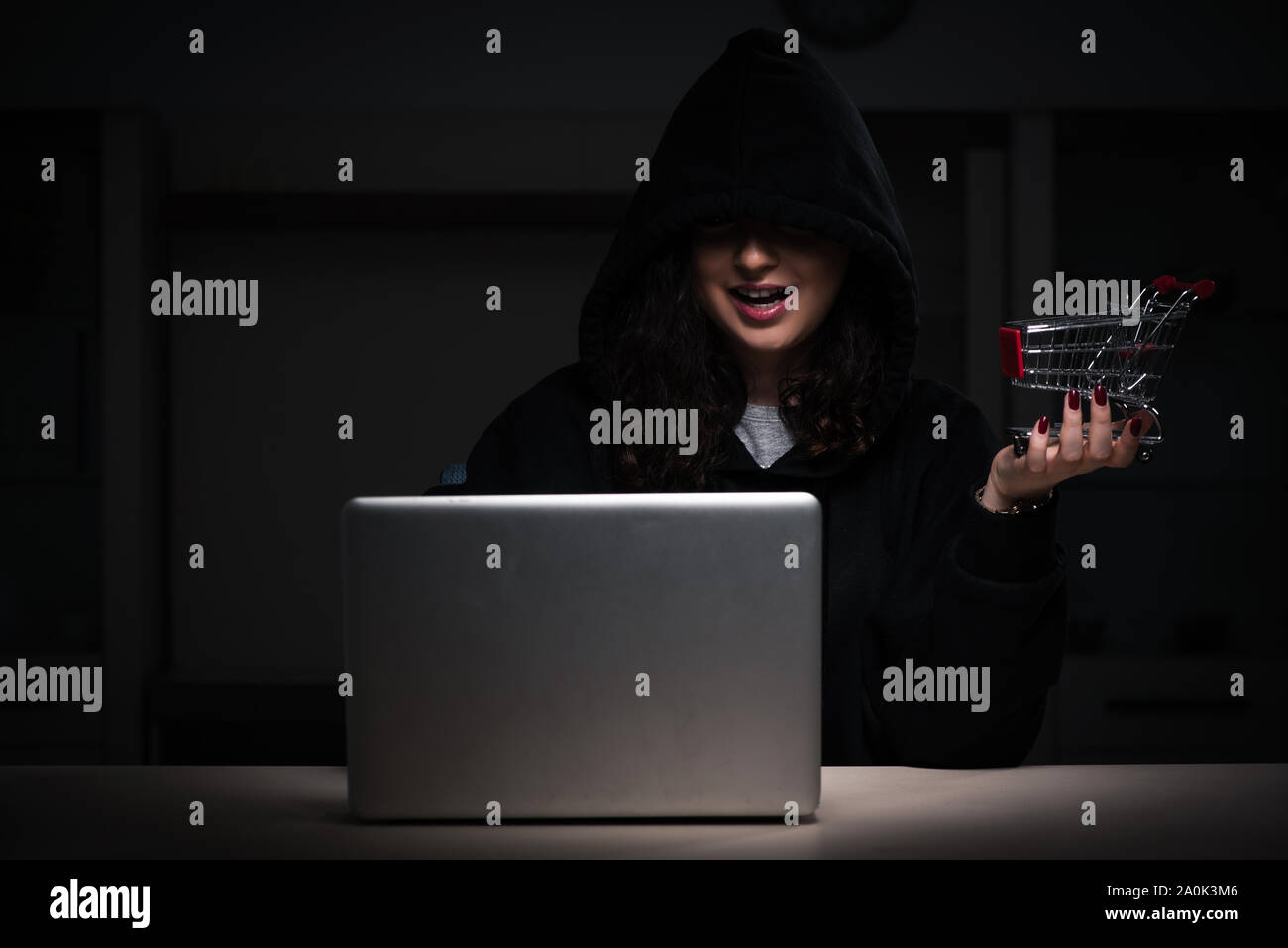 The female hacker hacking security firewall late in office Stock Photo ...