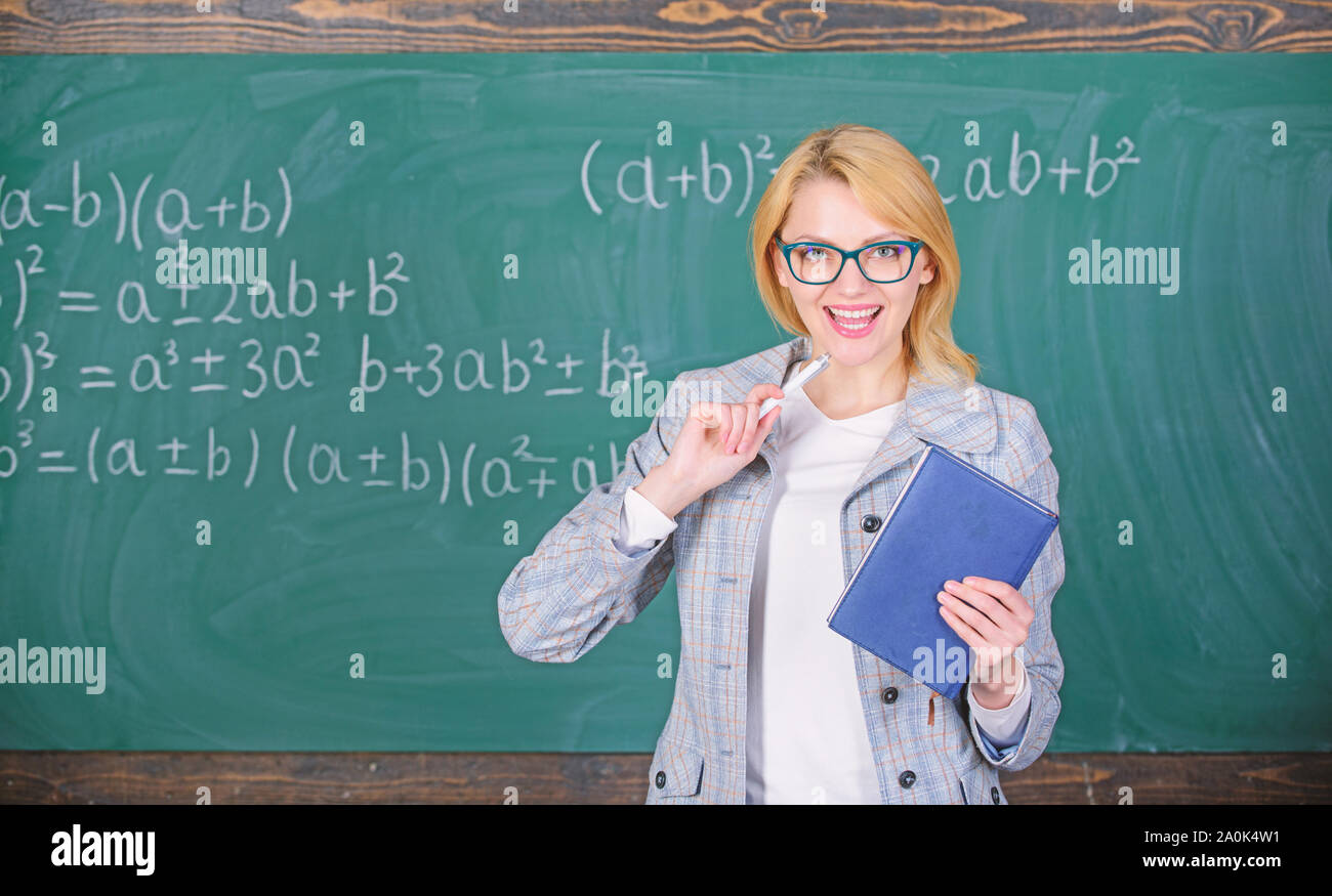 Teaching complex multifaceted activity. Teacher smart woman with book ...