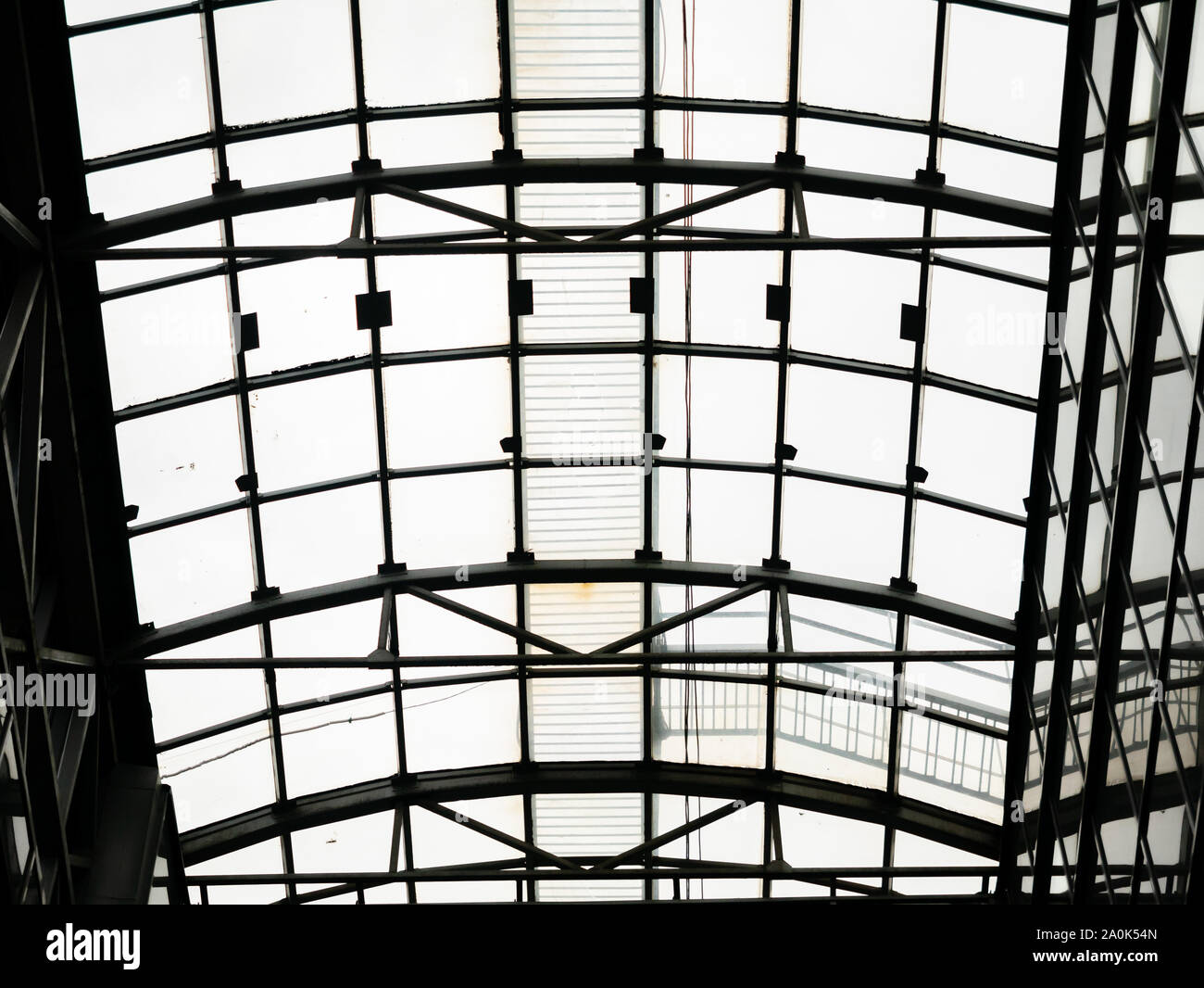 Openwork glazing of the roof over the shopping center. Ceiling in the ...