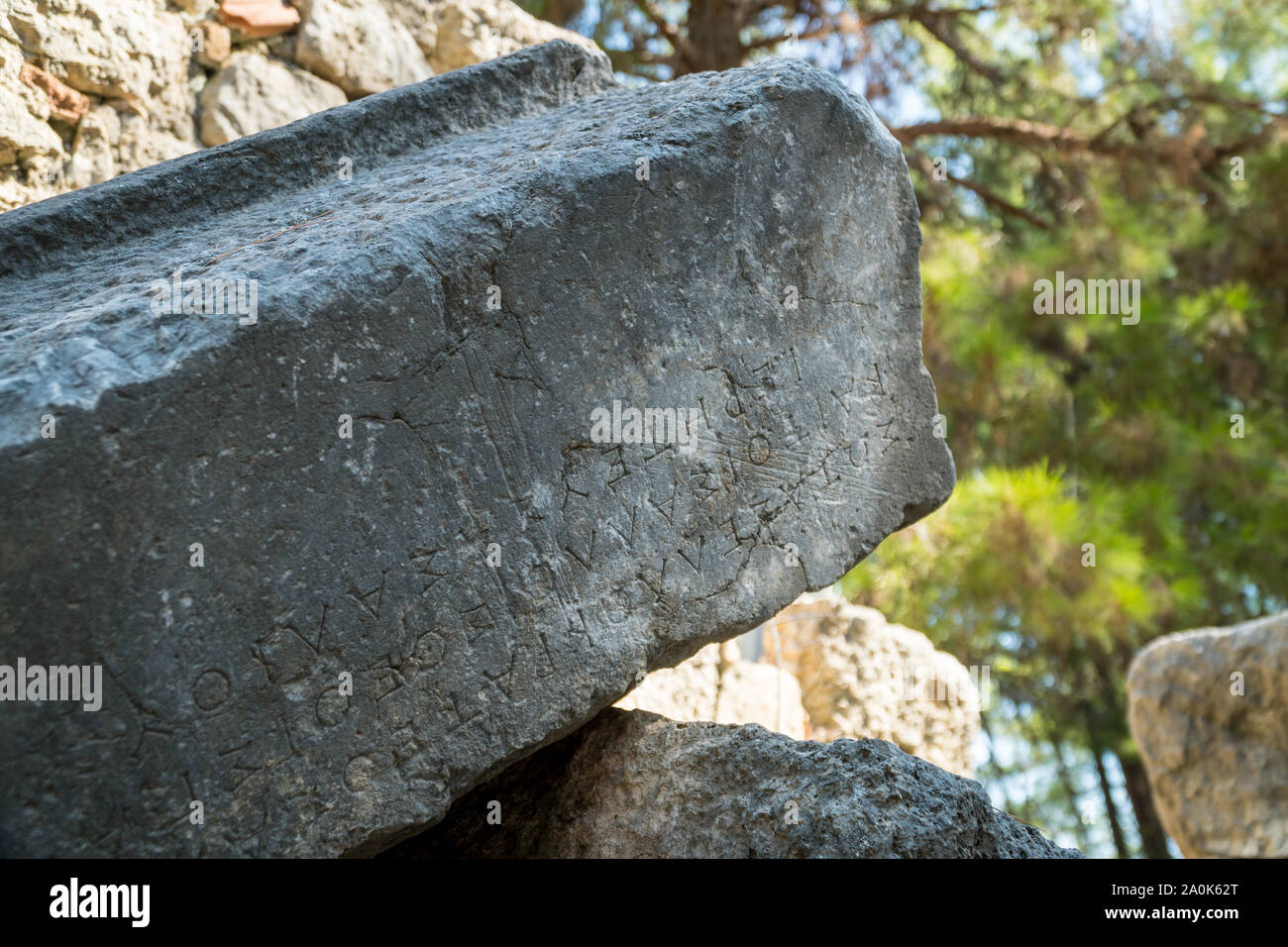 Greek text carved on ancient stones of Phaselis ruins, antient greek ...