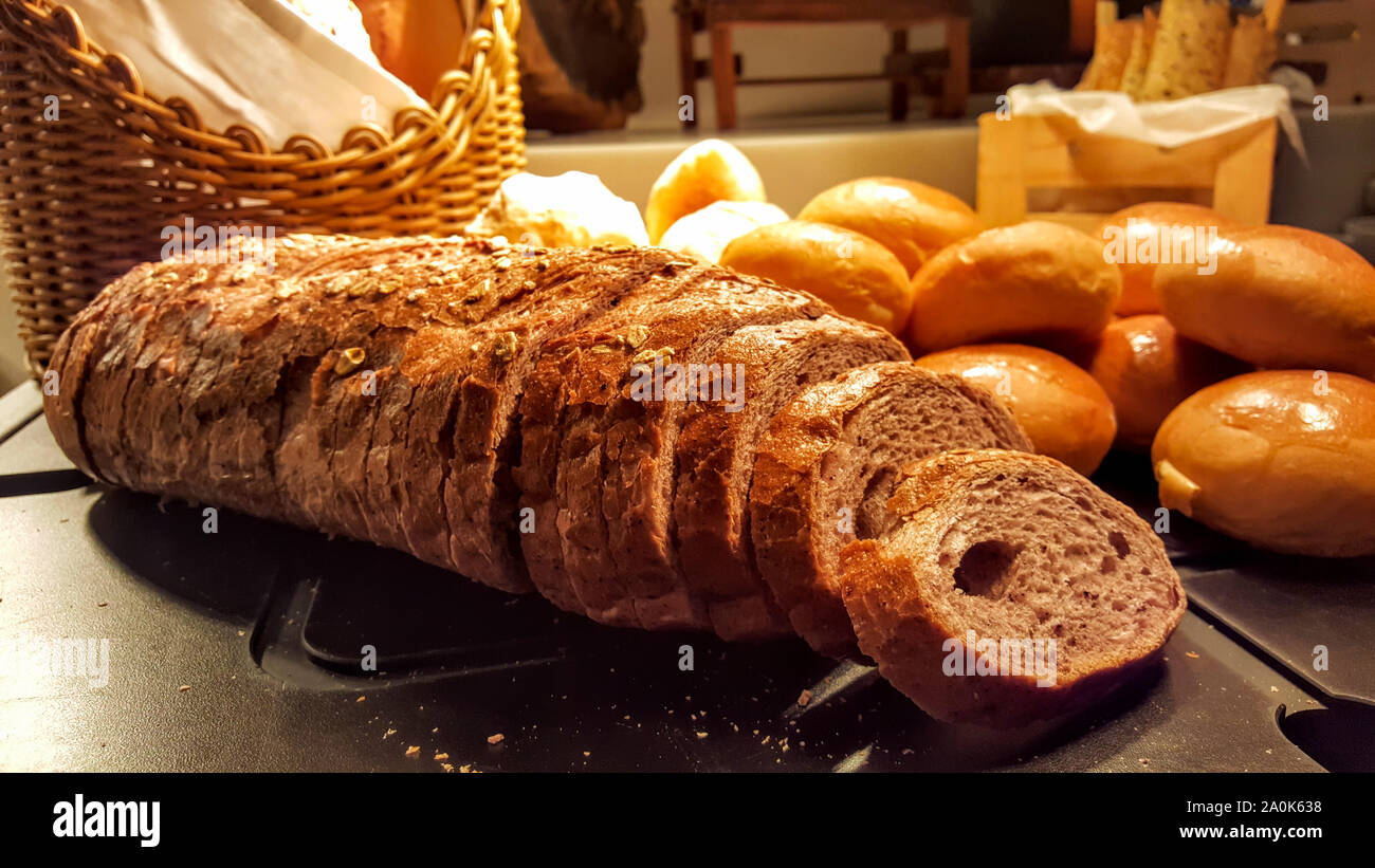 Fresh fragrant bread with black sesame on the table. a traditional ...