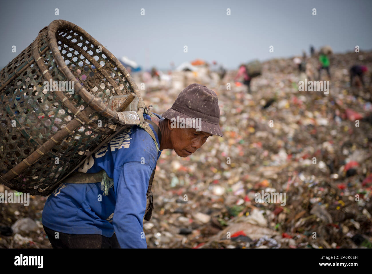 Garbage collector walks hi-res stock photography and images - Alamy