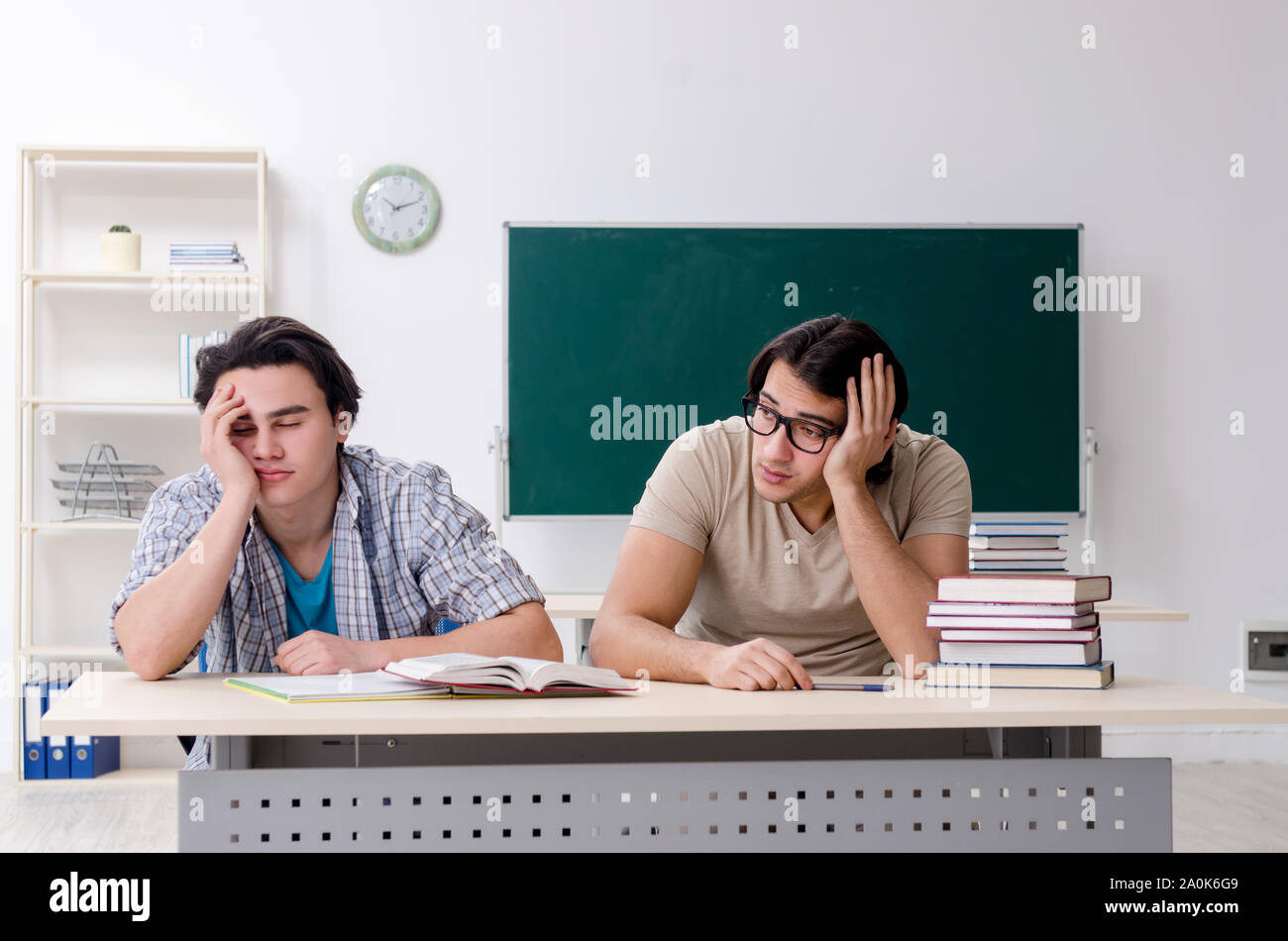 The two male students in the classroom Stock Photo - Alamy