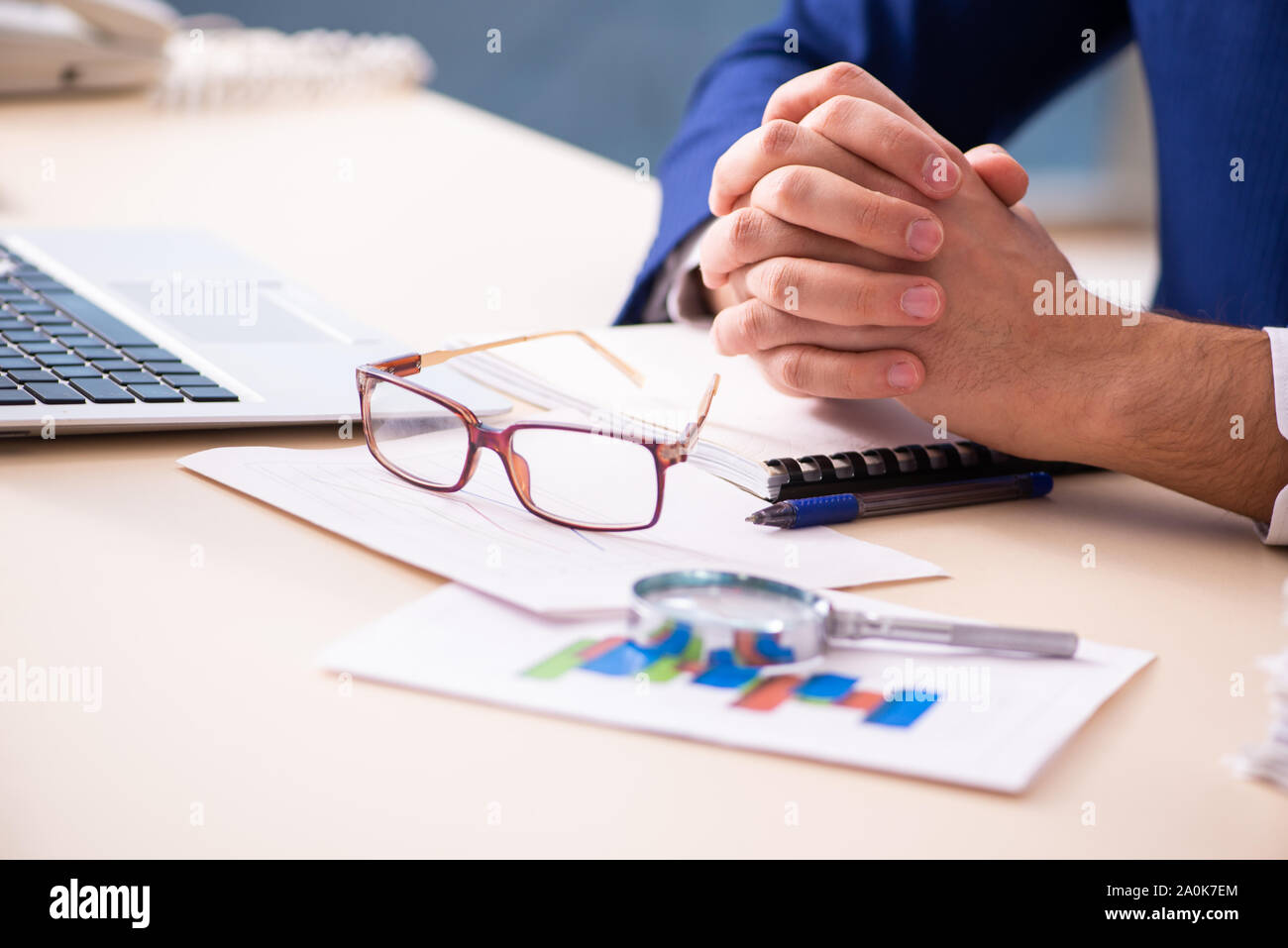 The young male sales analyst in growth concept Stock Photo - Alamy