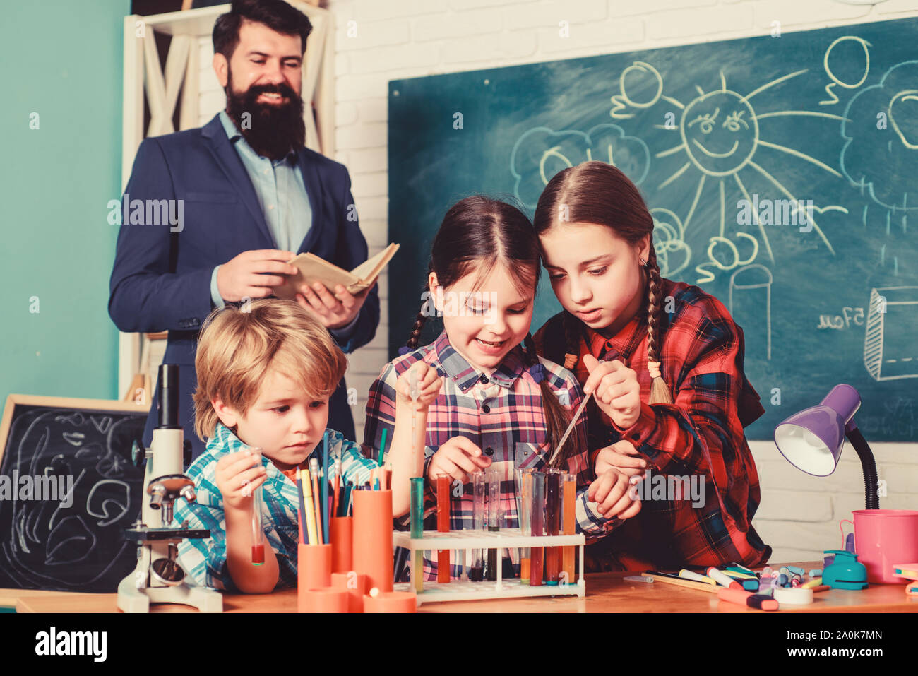 children making science experiments. Education. Science and education ...
