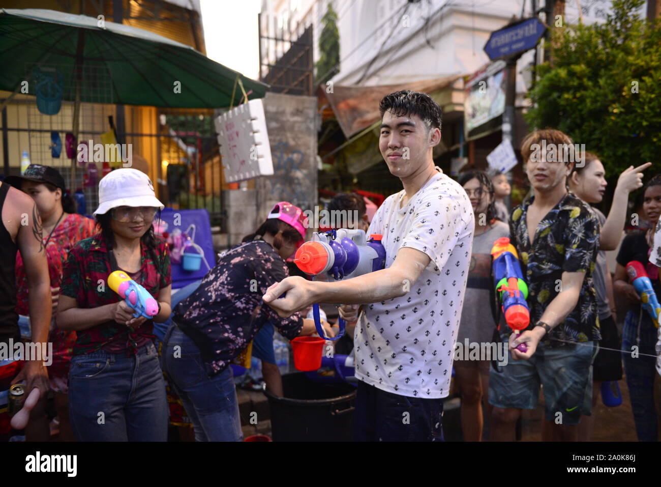 People celebrating the Songkran festival Stock Photo - Alamy