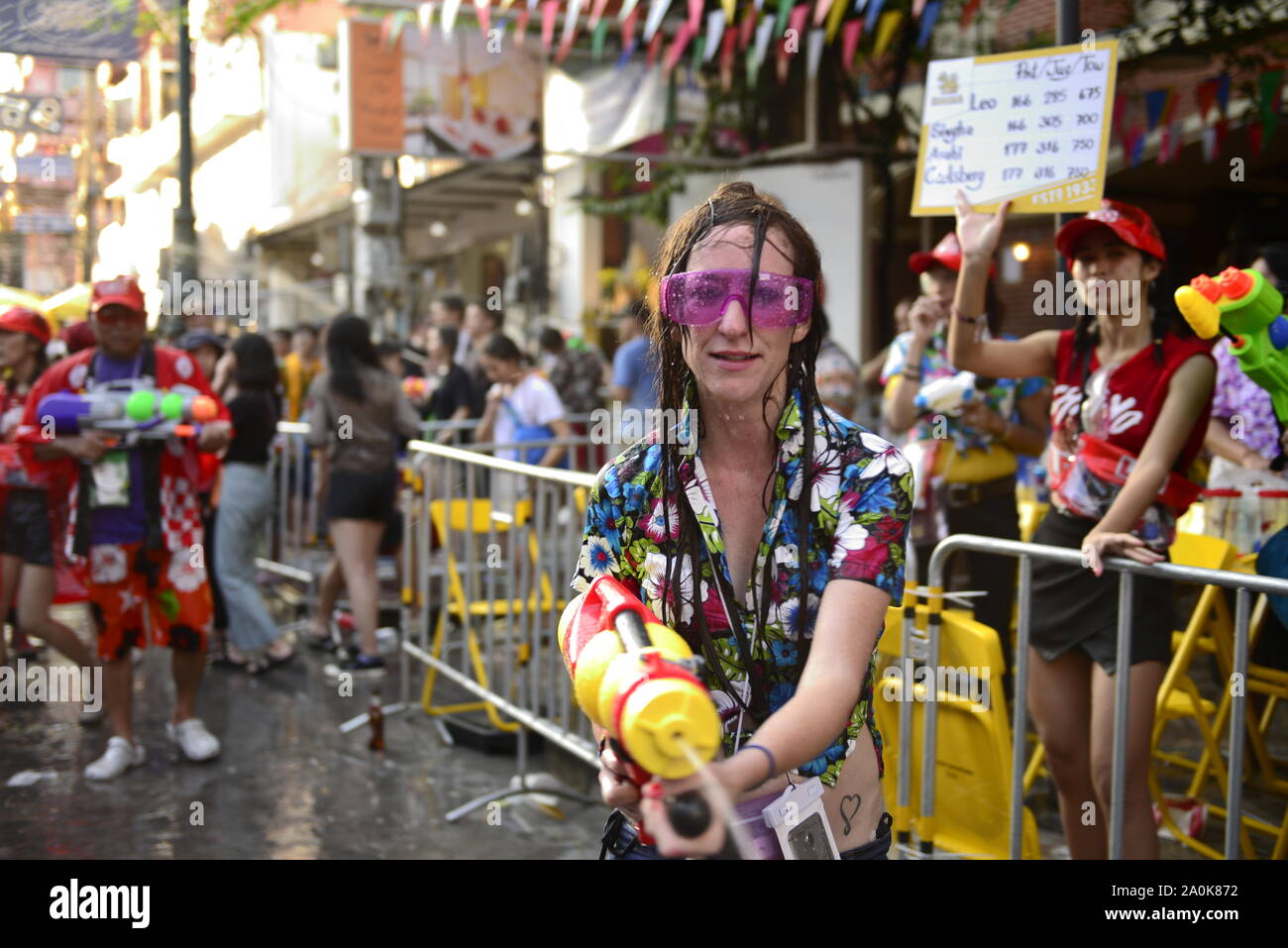 People celebrating the Songkran festival Stock Photo - Alamy