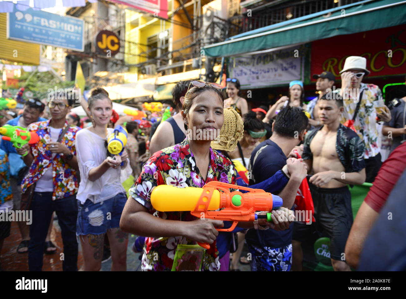People celebrating the Songkran festival Stock Photo - Alamy