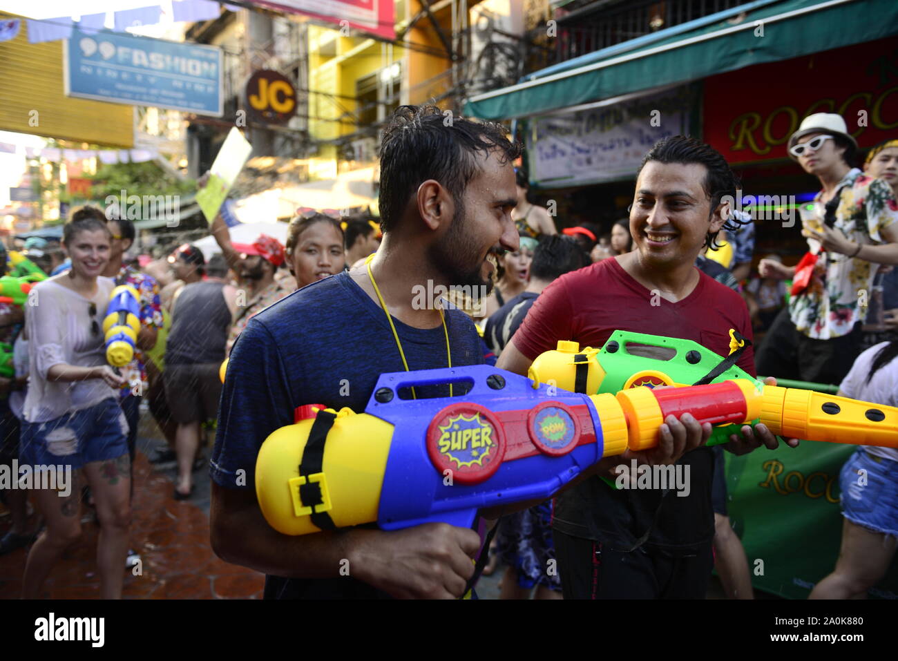 People celebrating the Songkran festival Stock Photo - Alamy