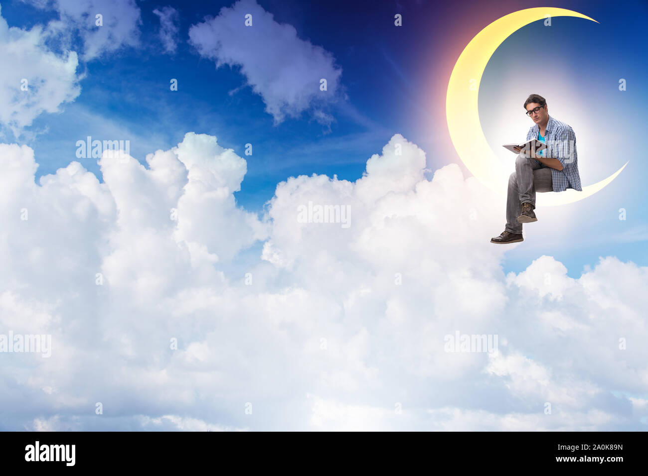 The student reading book on the moon crescent Stock Photo - Alamy