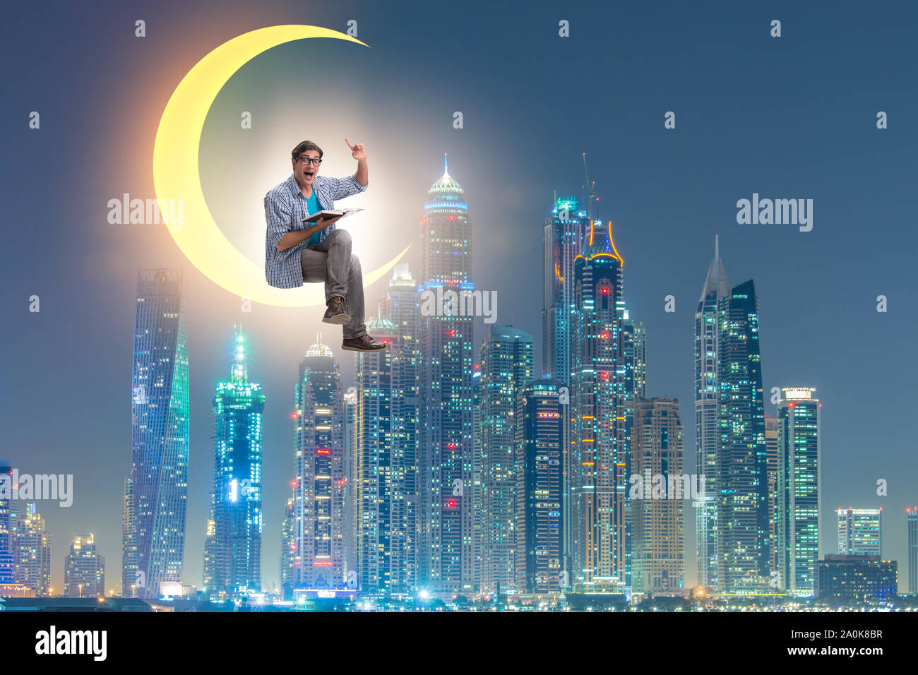 The student reading book on the moon crescent Stock Photo - Alamy