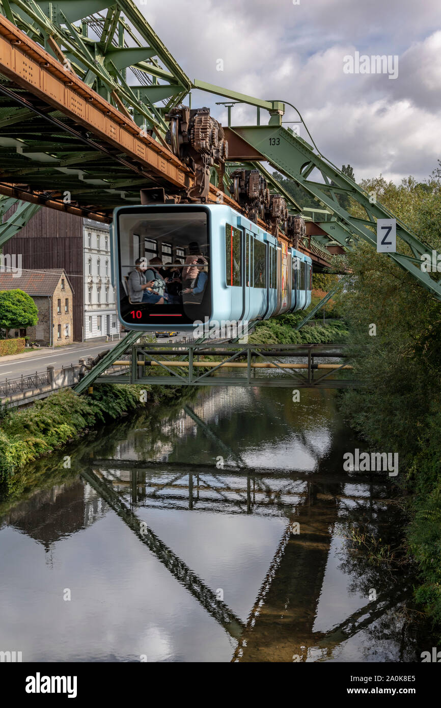 The amazing hanging monorail called the Schwebebahn in Wuppertal, near ...