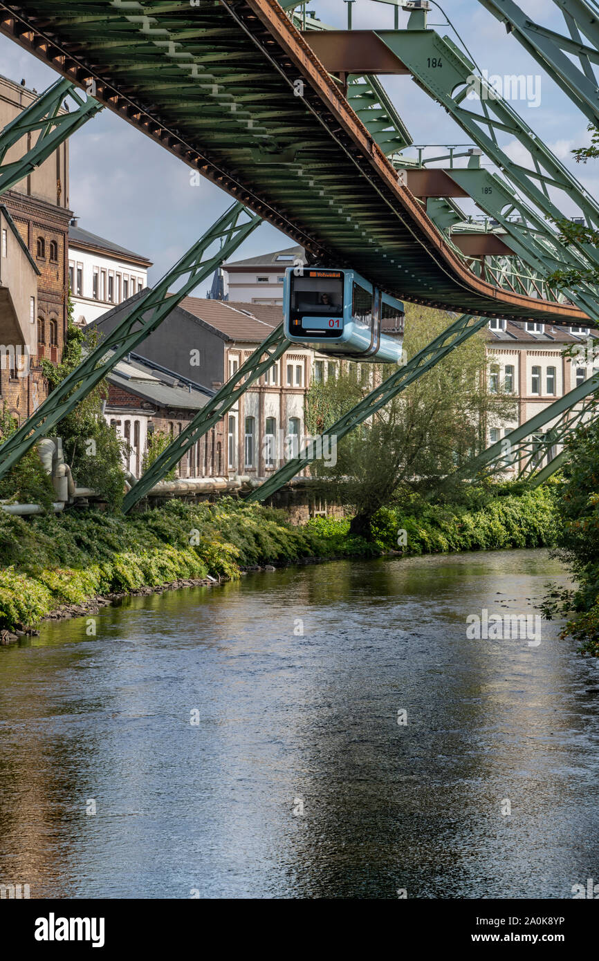 The amazing hanging monorail called the Schwebebahn in Wuppertal, near ...