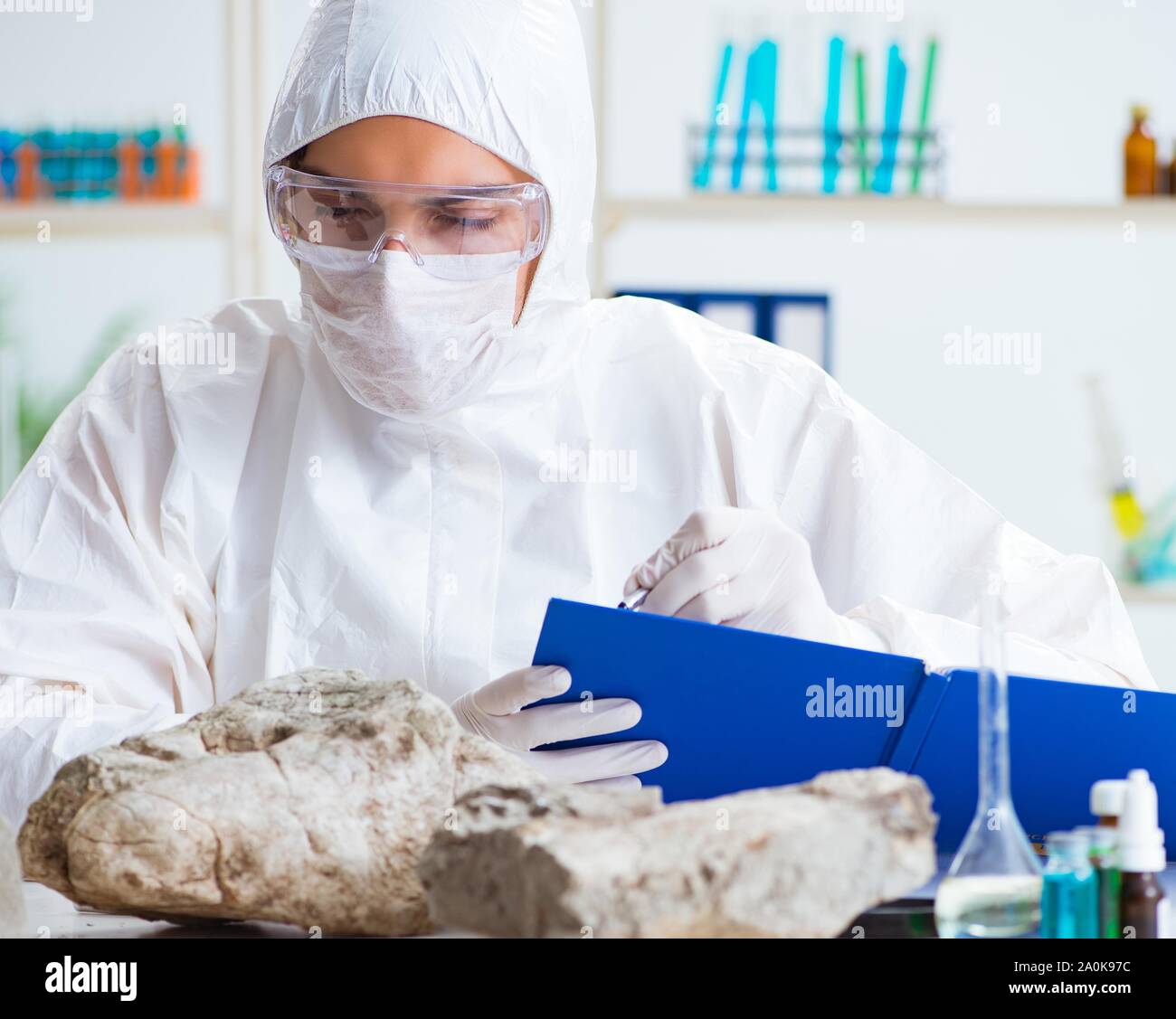 The scientist looking and stone samples in lab Stock Photo - Alamy