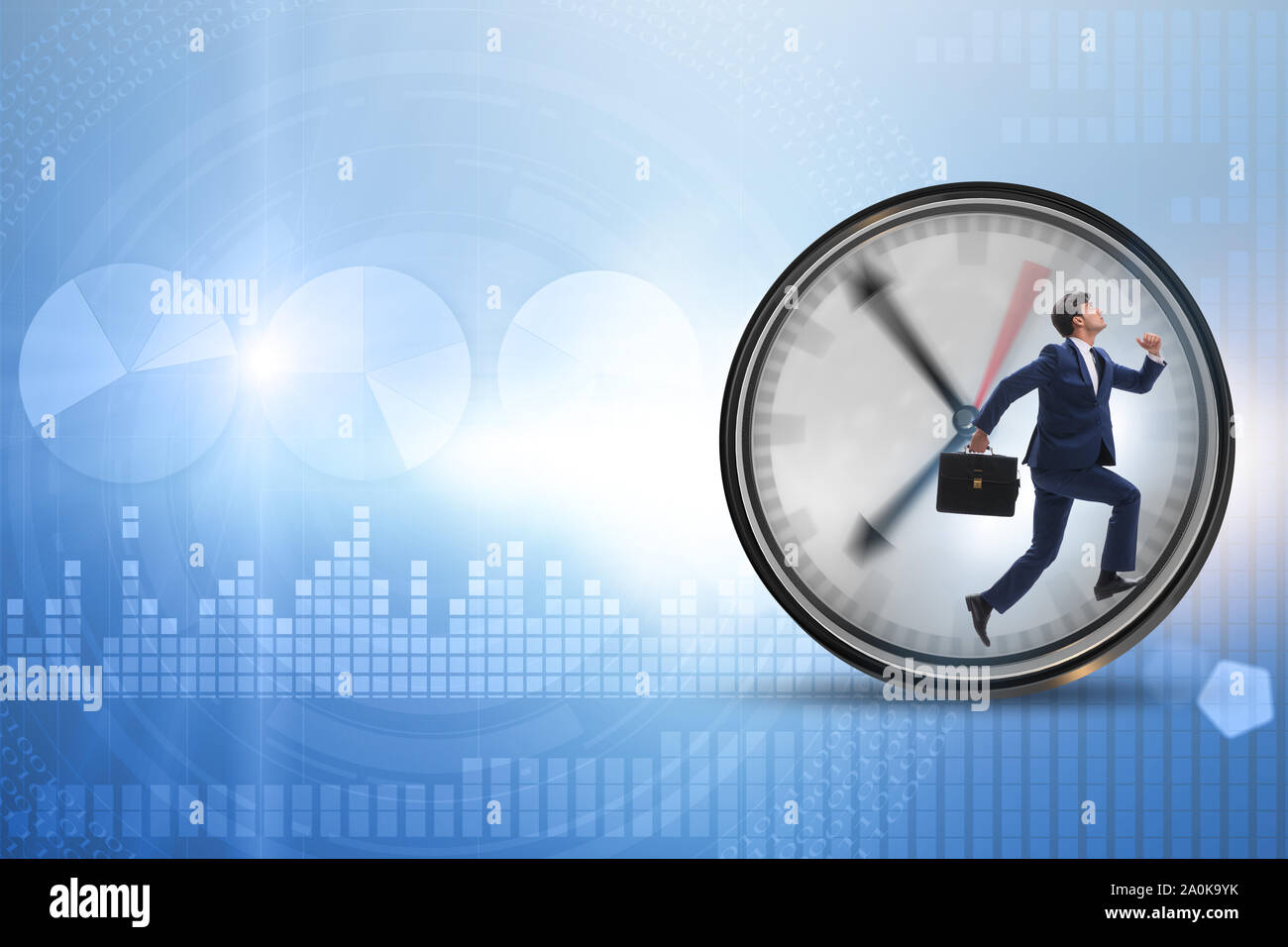 The businessman employee in time management concept Stock Photo - Alamy