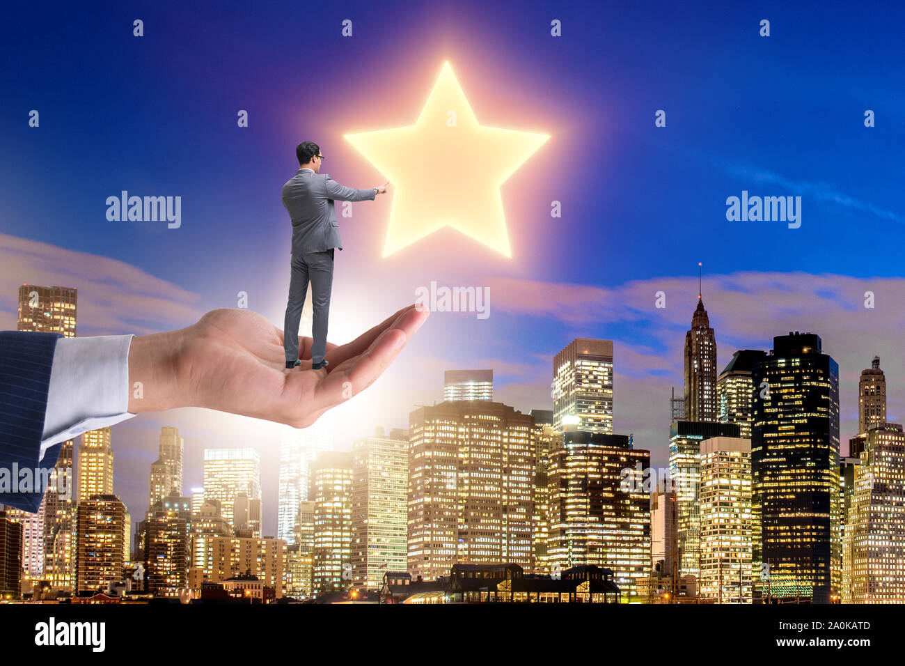 The businessman held on hand reaching out for stars Stock Photo - Alamy