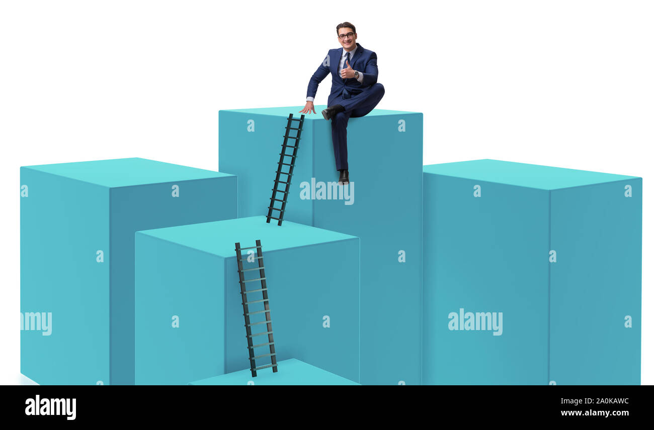 The businessman on top of block isolated on white Stock Photo - Alamy