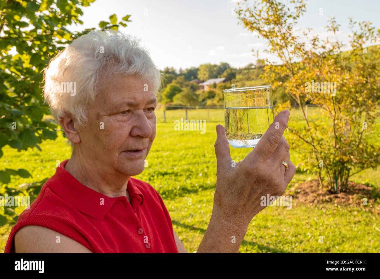 Lady testing the water hi-res stock photography and images - Alamy