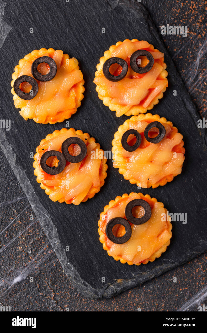 Halloween scary mini mummy pizza Stock Photo - Alamy
