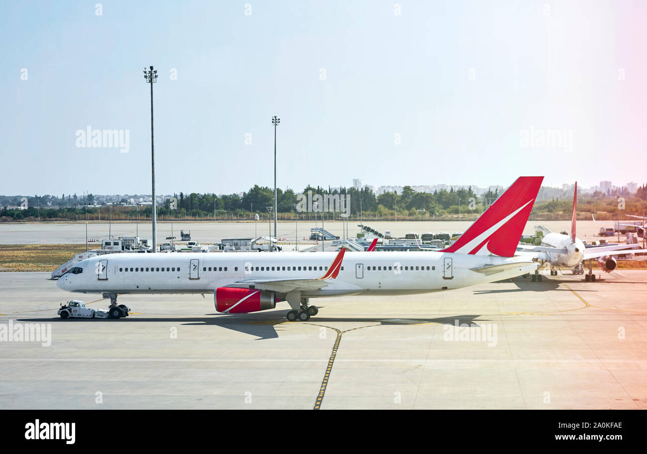 passenger plane is at the ramp Stock Photo - Alamy