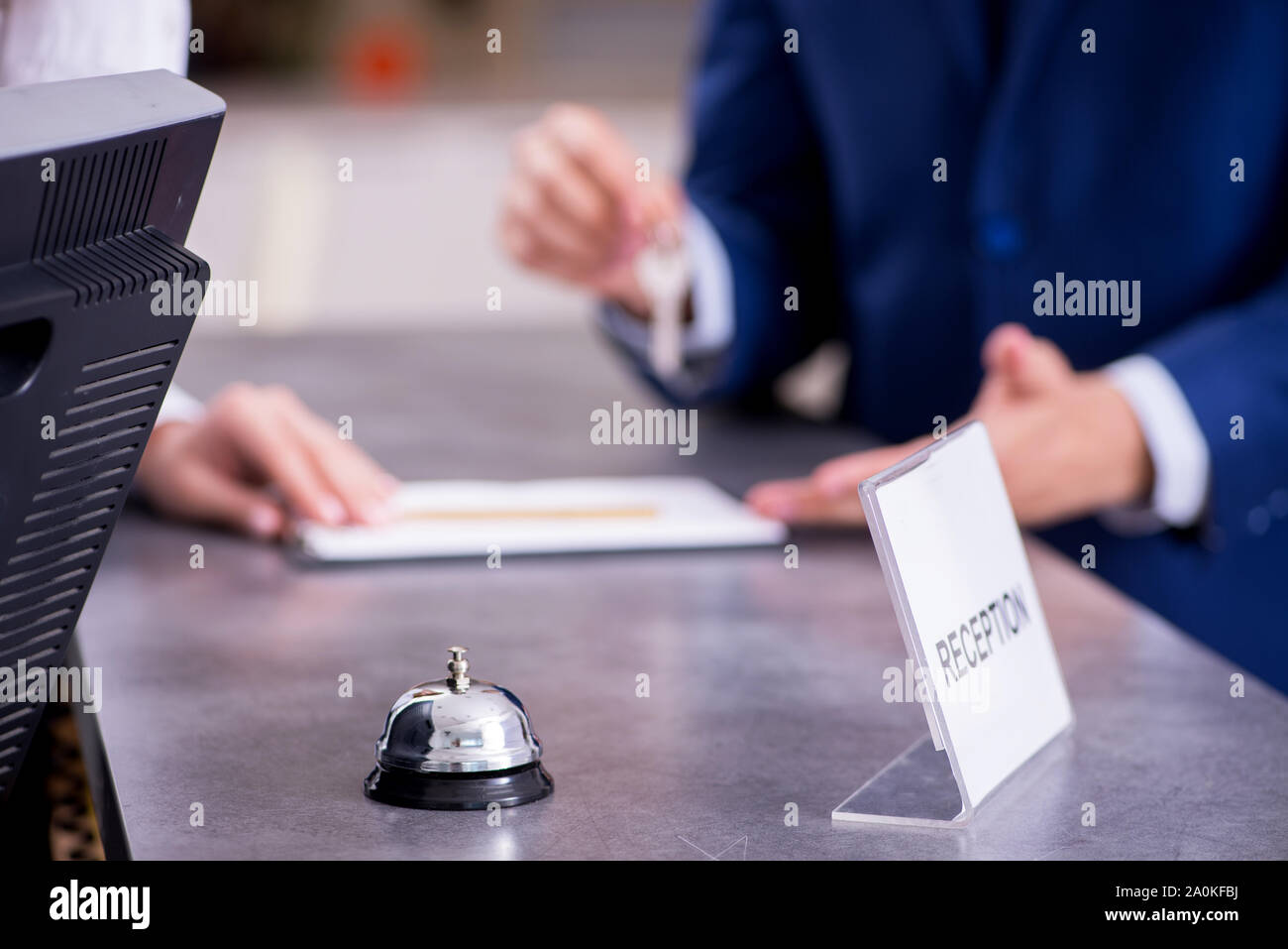 The hotel reception bell at the counter Stock Photo - Alamy