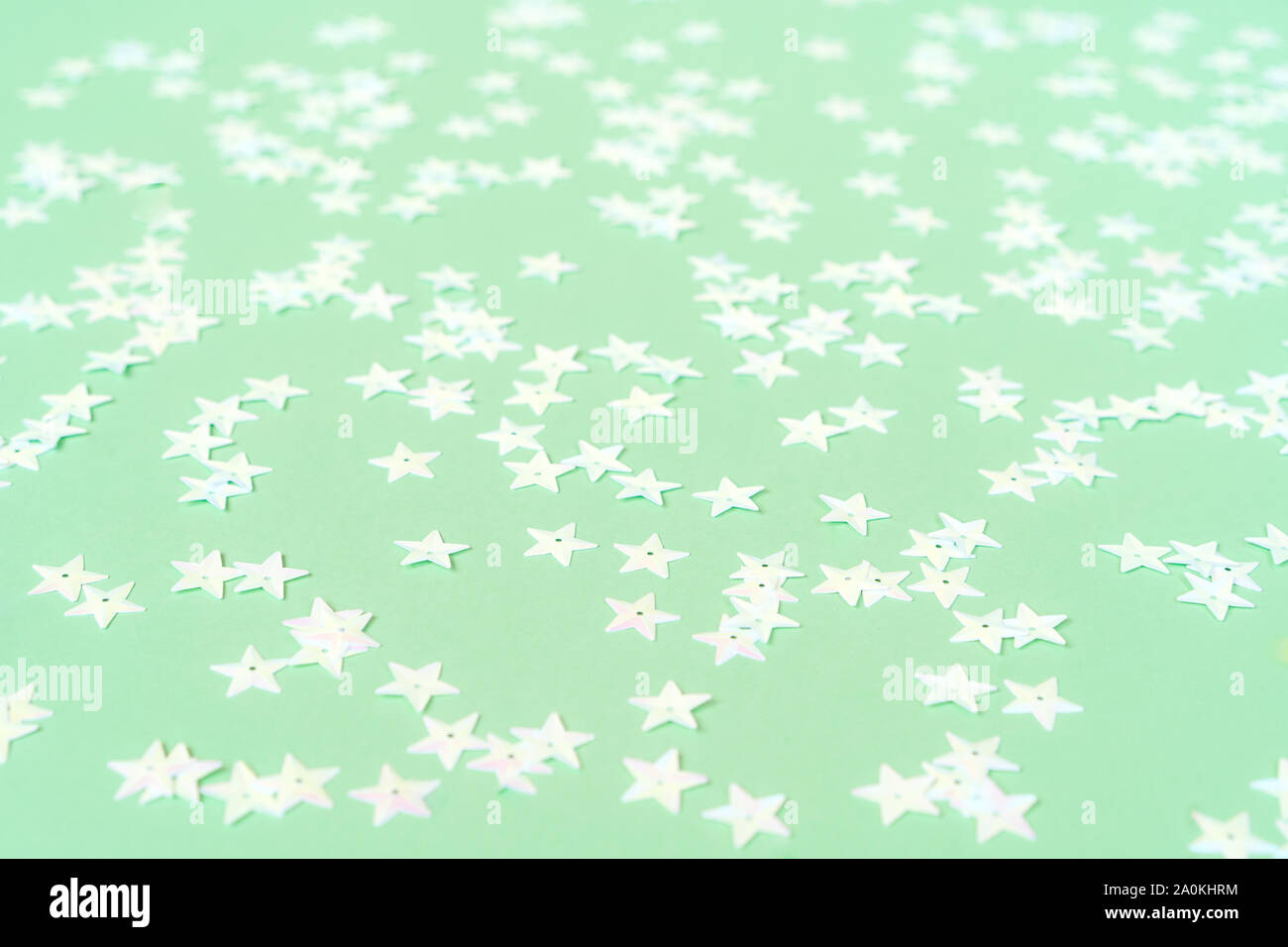 Light pink pearl stars on a mint pastel background Stock Photo - Alamy