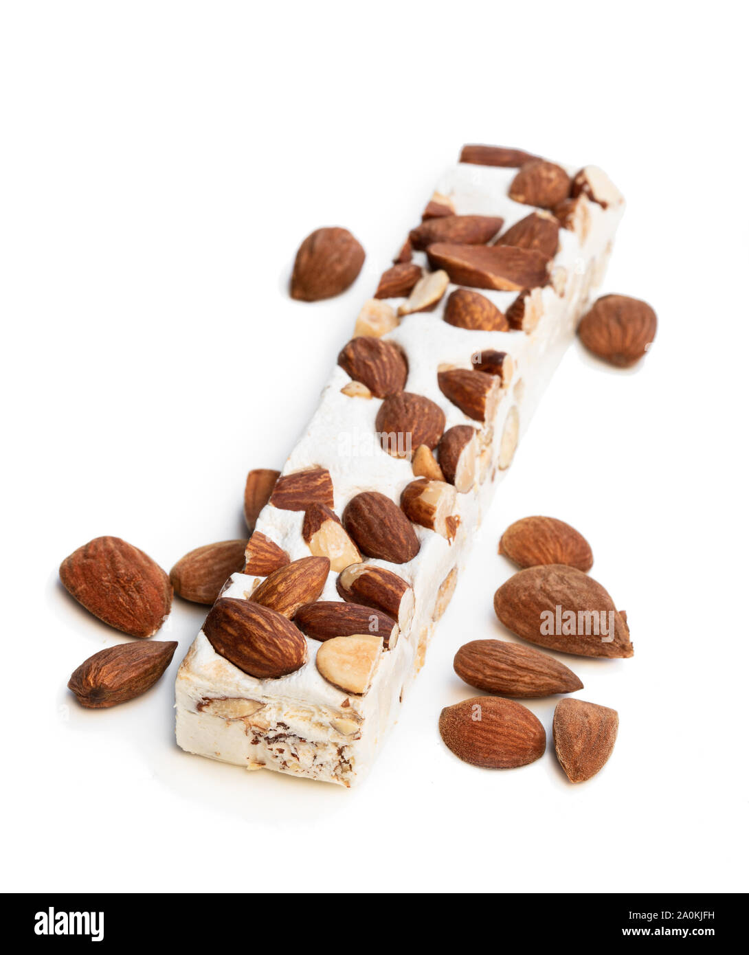Homemade nougat bar with almonds isolated on white Stock Photo - Alamy
