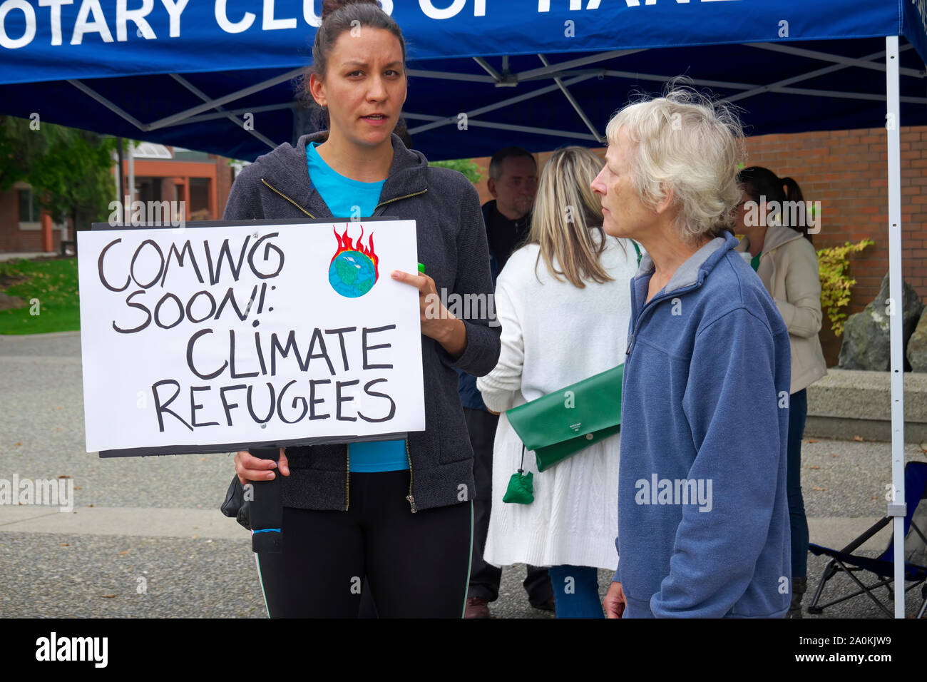 Soming soon climate refugees sign hi-res stock photography and images ...