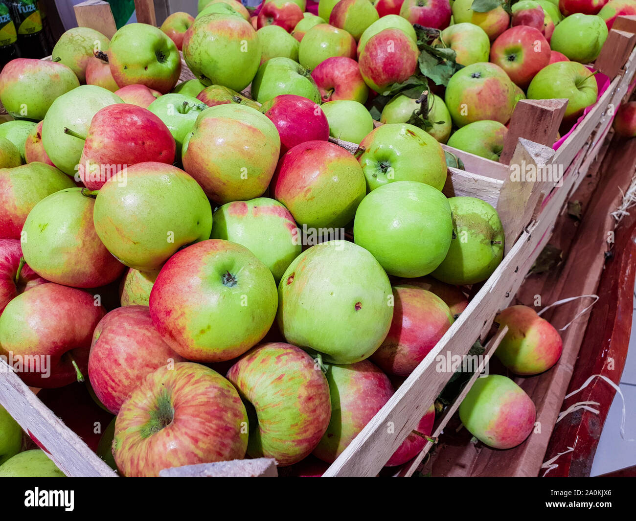 Assortment of fresh apple fruits at market Stock Photo - Alamy