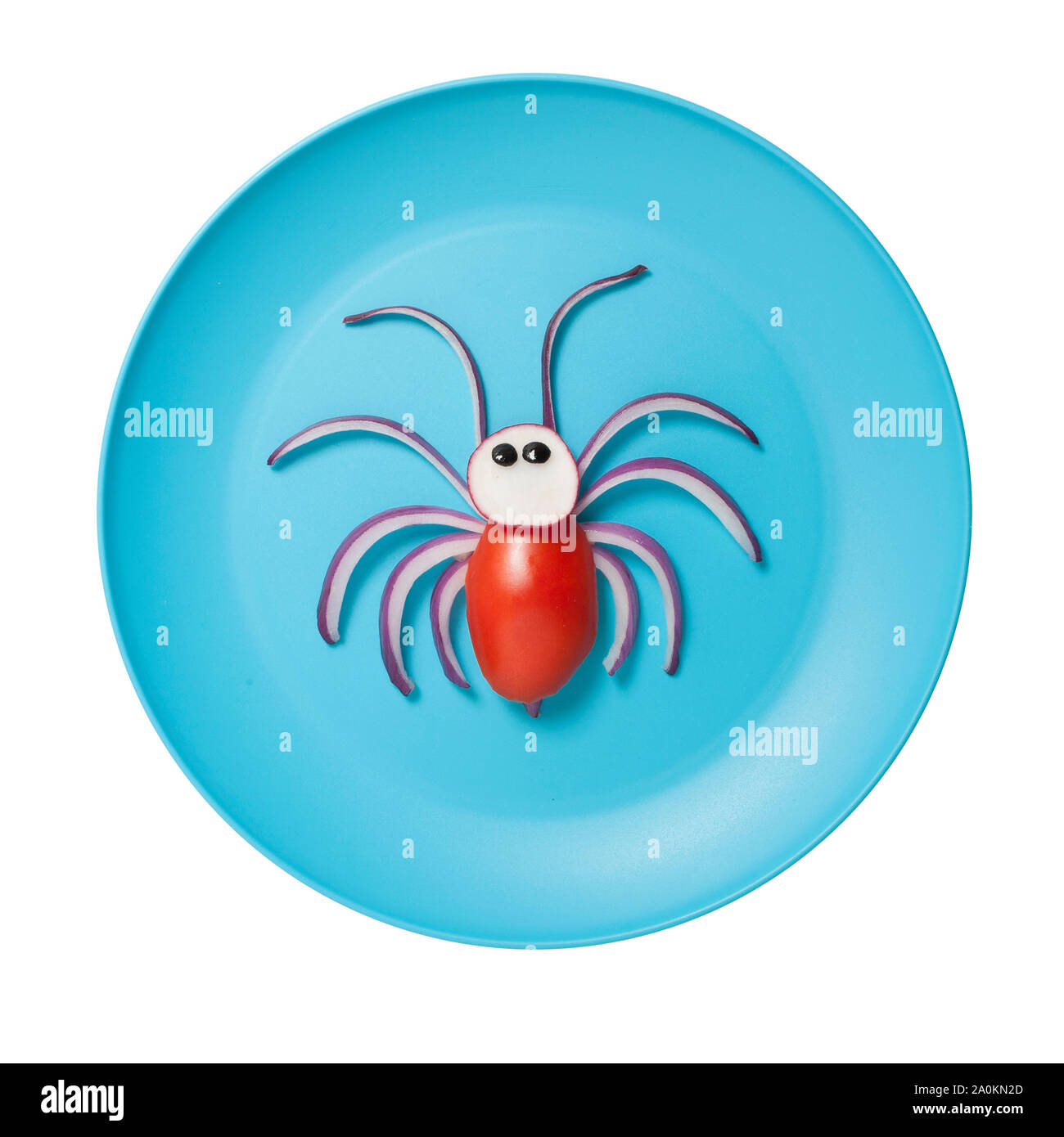 Creative idea of making a spider with fresh vegetables Stock Photo - Alamy