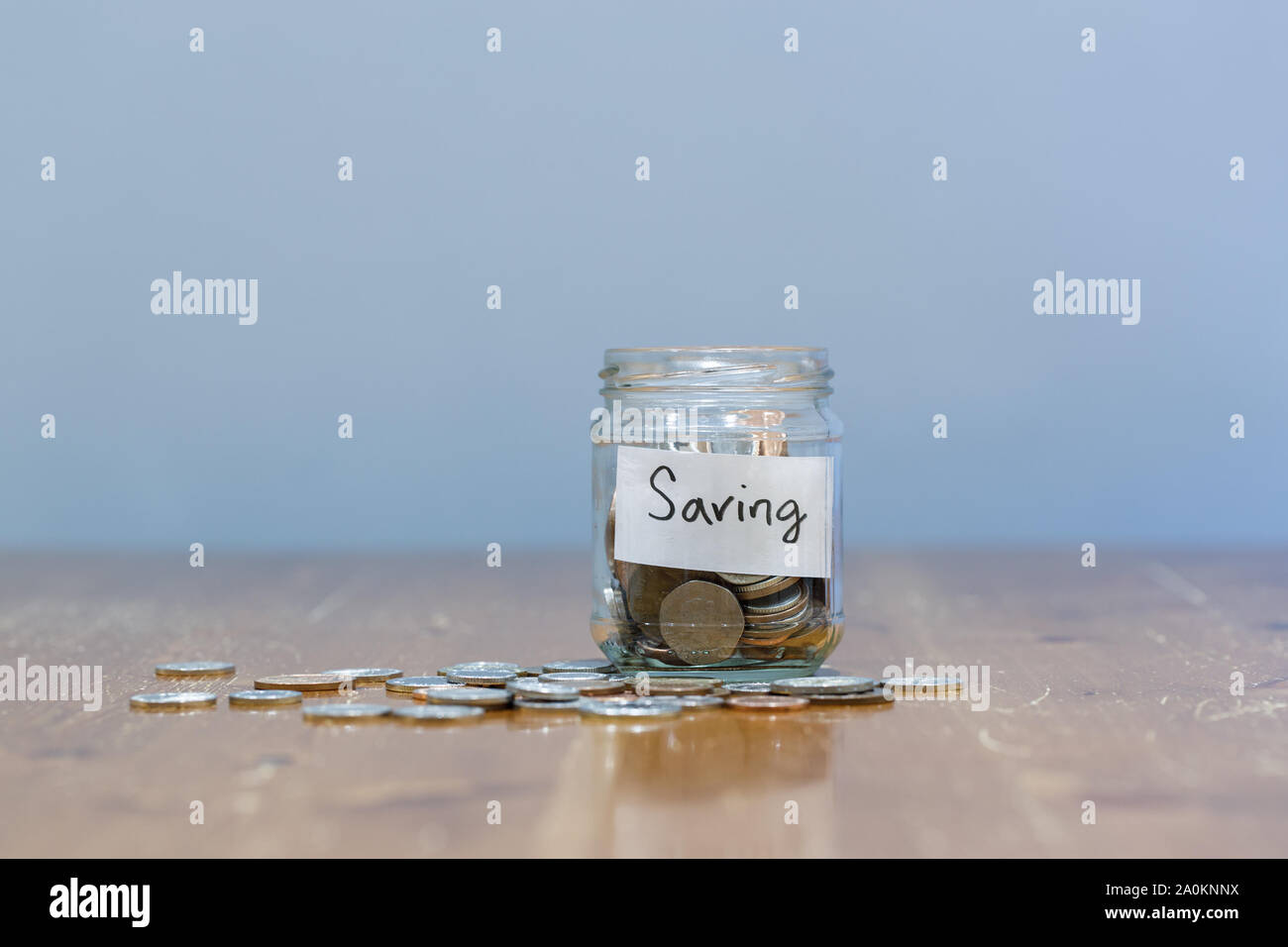 Saving money for our future financial need Stock Photo - Alamy