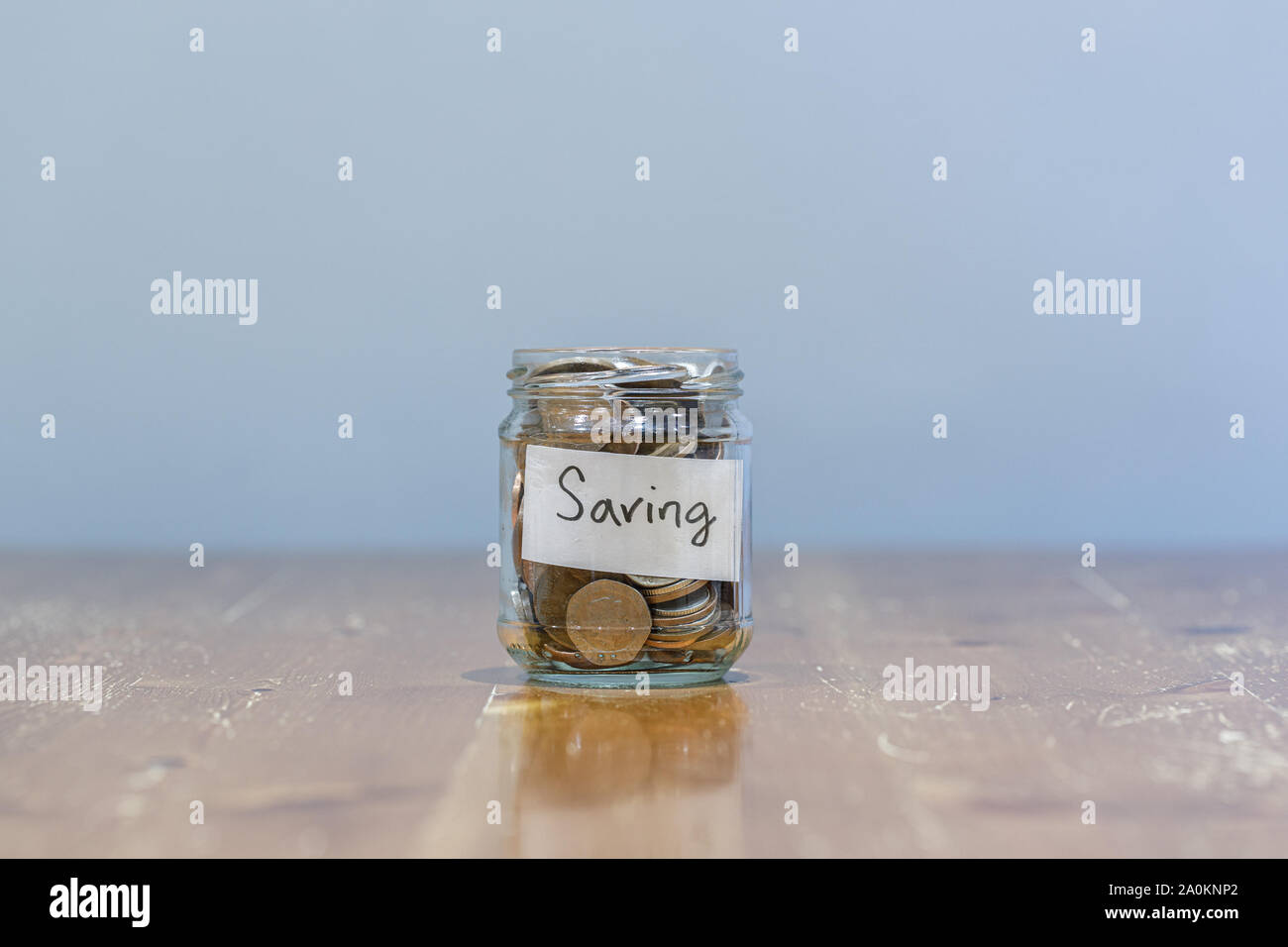 Saving money for our future financial need Stock Photo - Alamy