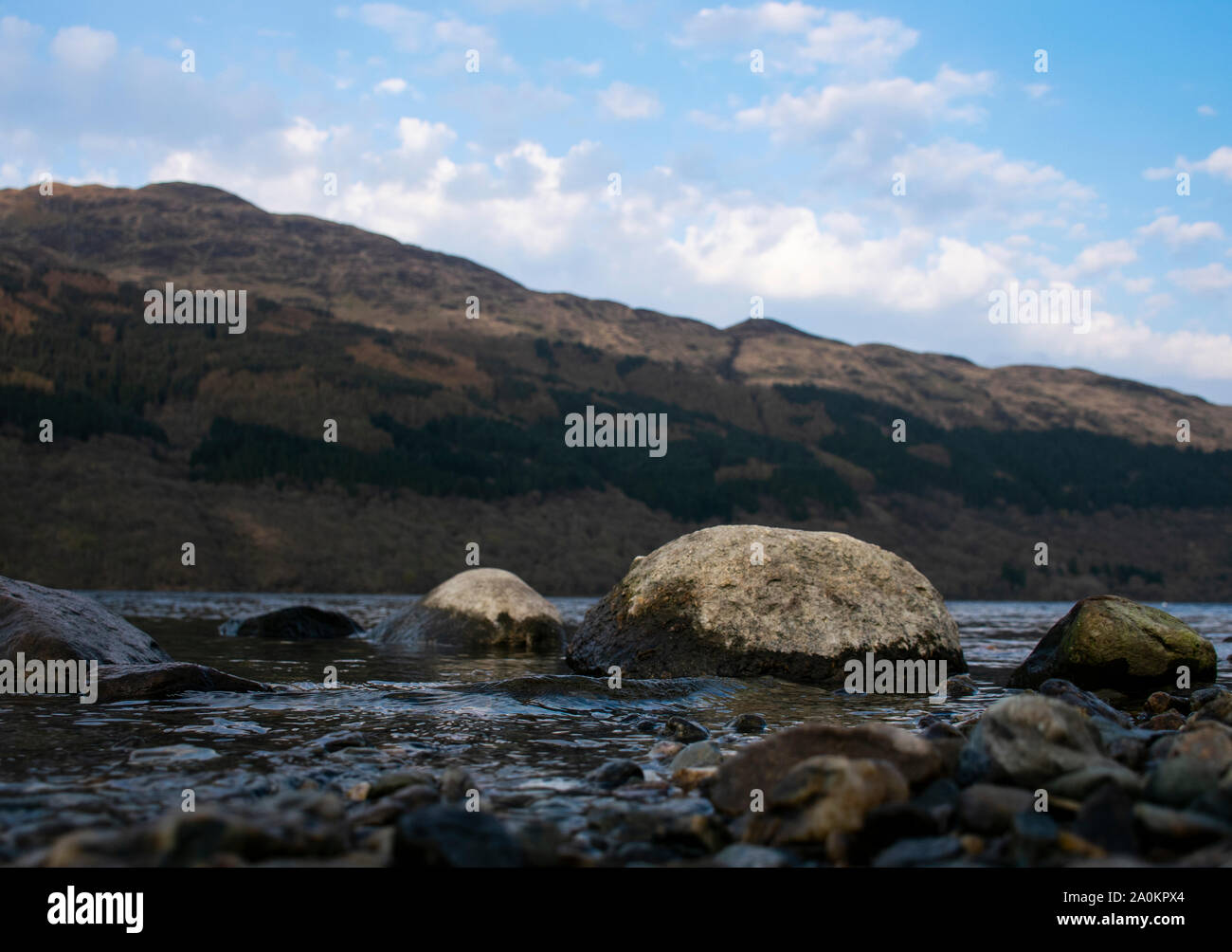 Rocks on the Loch Stock Photo - Alamy