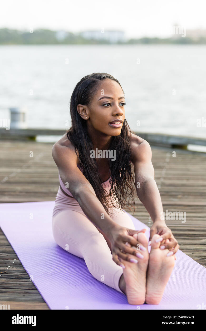 Tara doing early morning yoga outside on a summer day Stock Photo - Alamy