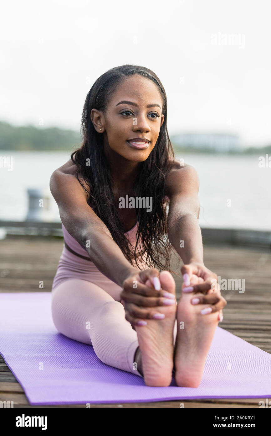 Early morning yoga hi-res stock photography and images - Alamy