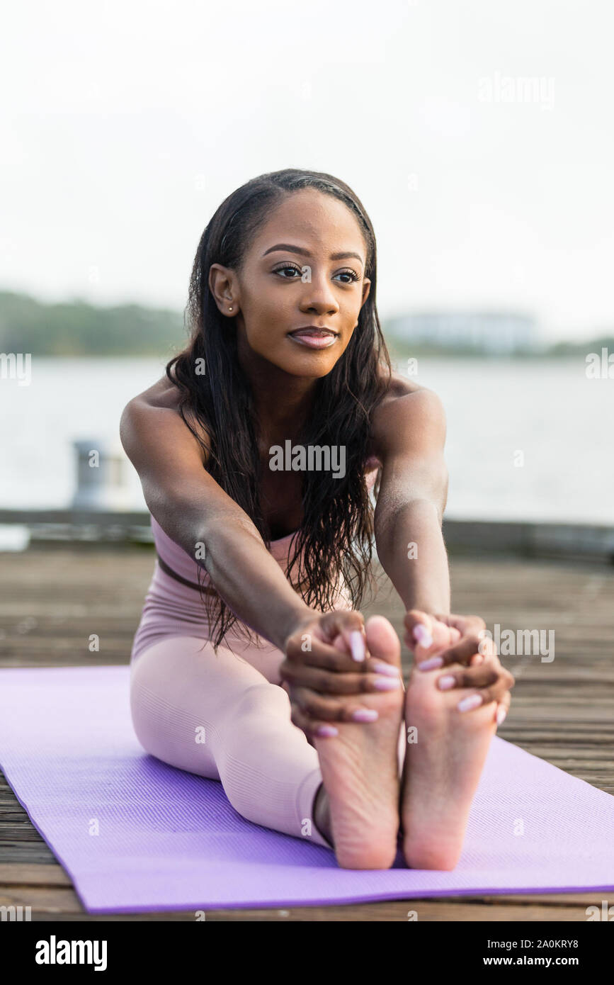 Tara doing early morning yoga outside on a summer day Stock Photo - Alamy