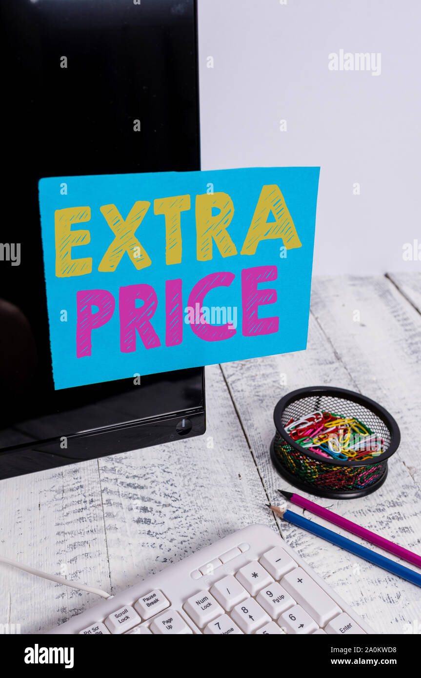 Writing note showing Extra Price. Business concept for extra price ...