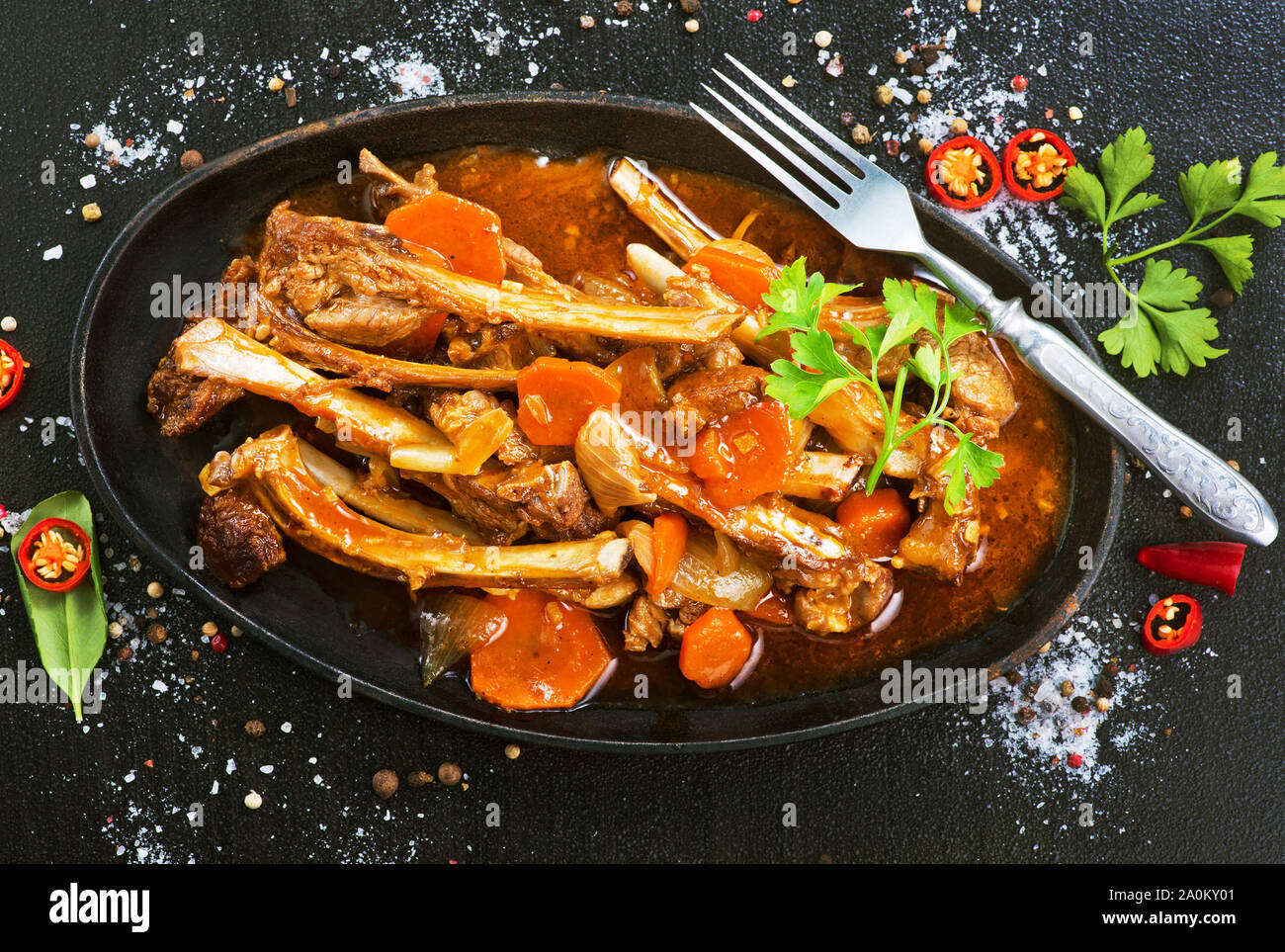 fried meat with spice on the pan Stock Photo - Alamy