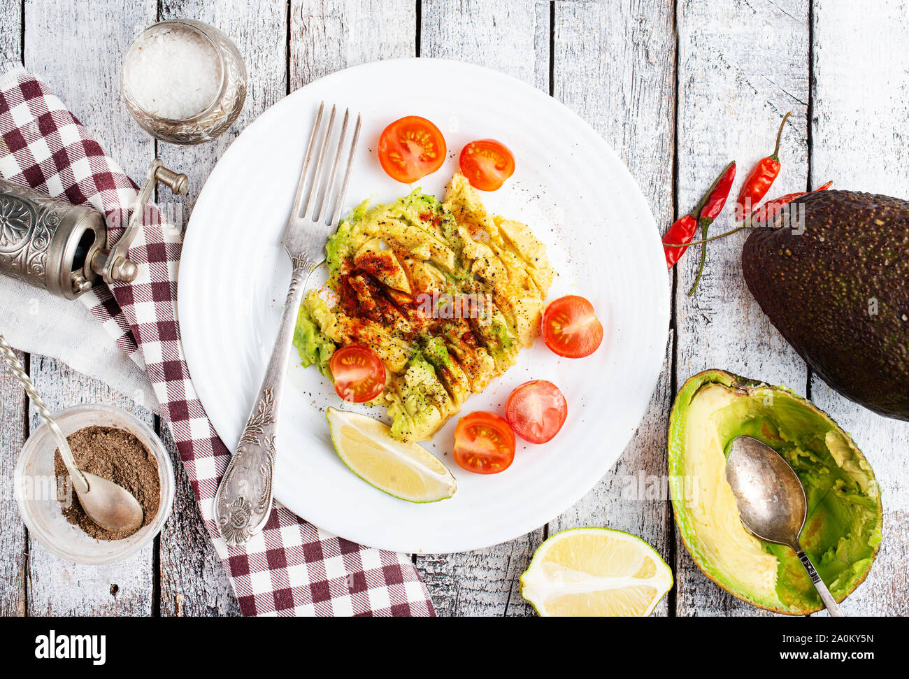 fresh avocado with spice oil and salt Stock Photo - Alamy