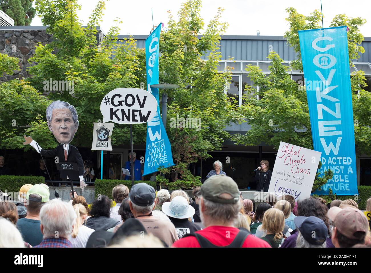 A giant sign depicting President George Bush Jr. at the Climate Strike ...