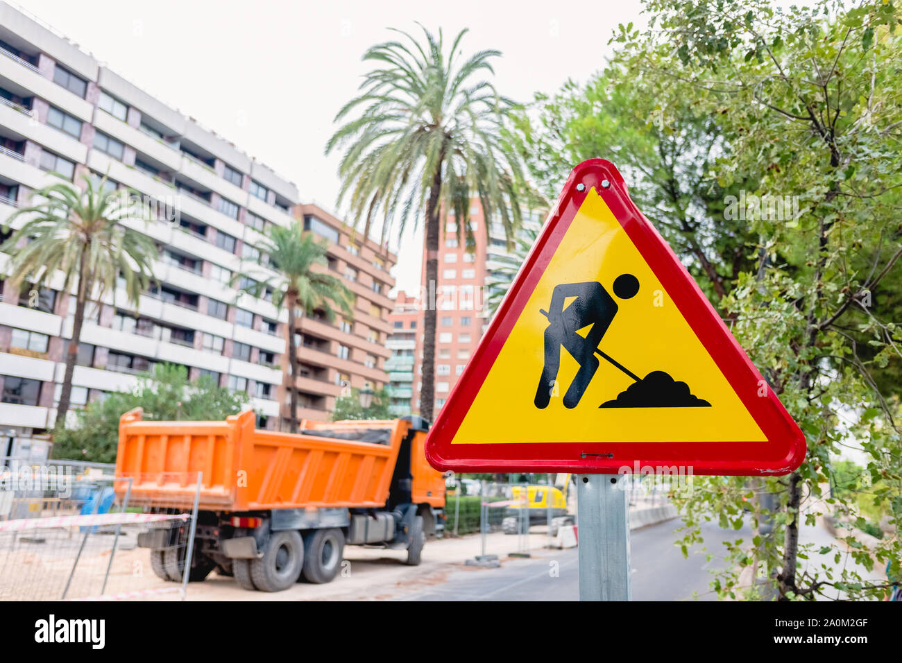 Road sign warning of works in a city Stock Photo - Alamy