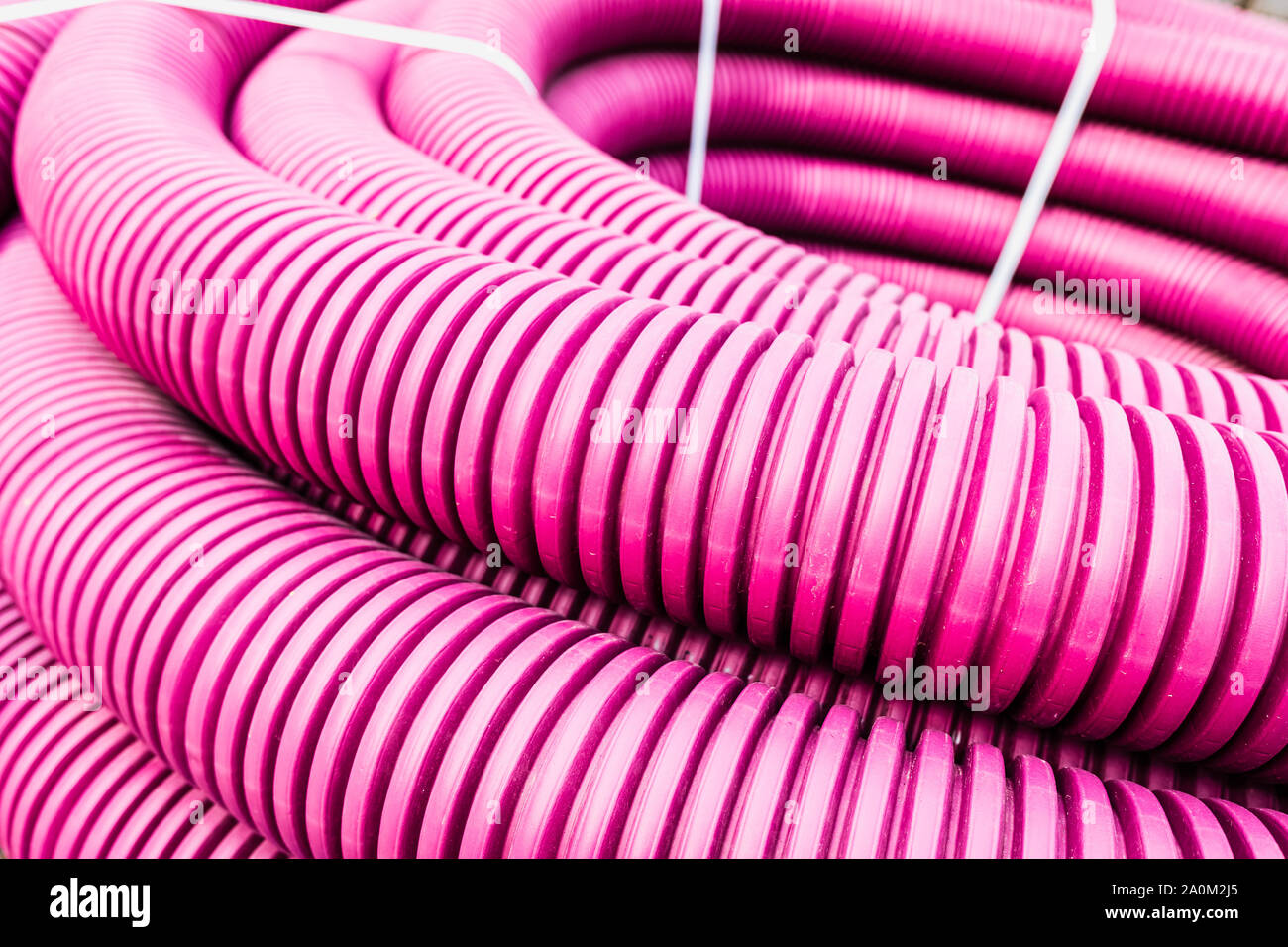Detail of plastic cylindrical tubes to protect buried city cables Stock ...